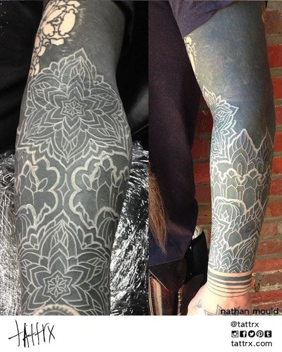 Tattoo uploaded by Tattoodo • White ink over blackwork tattoo #whiteink ...