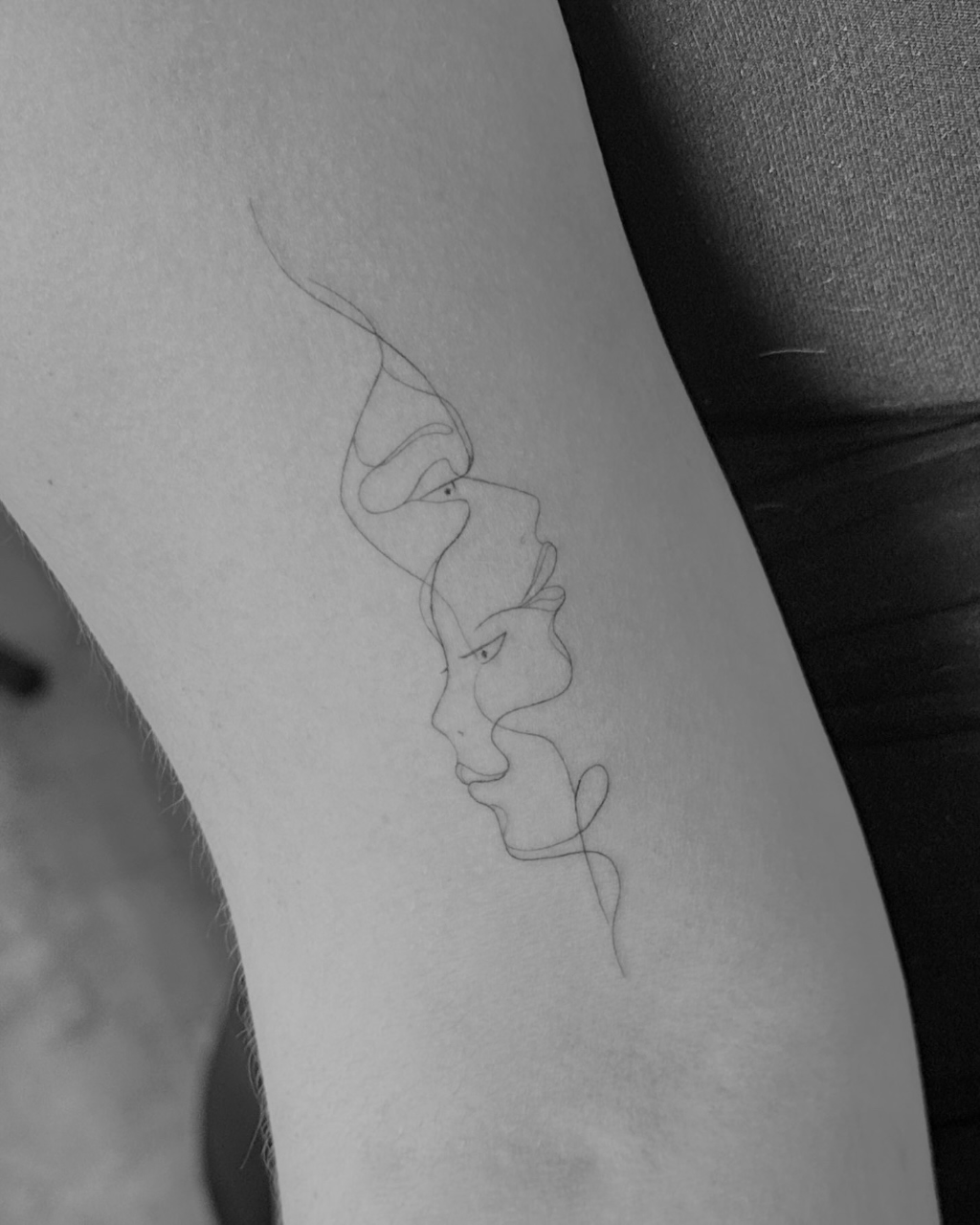 Intertwined Faces • Tattoodo