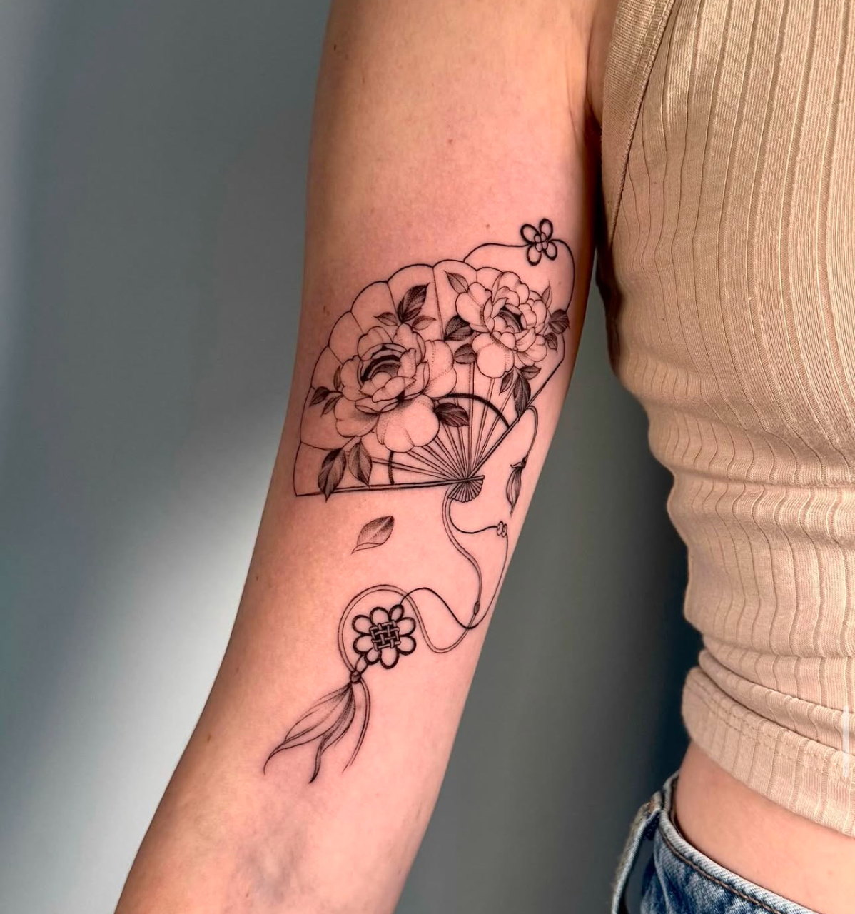 Elegant Fine Line Floral Tattoo • Tattoodo
