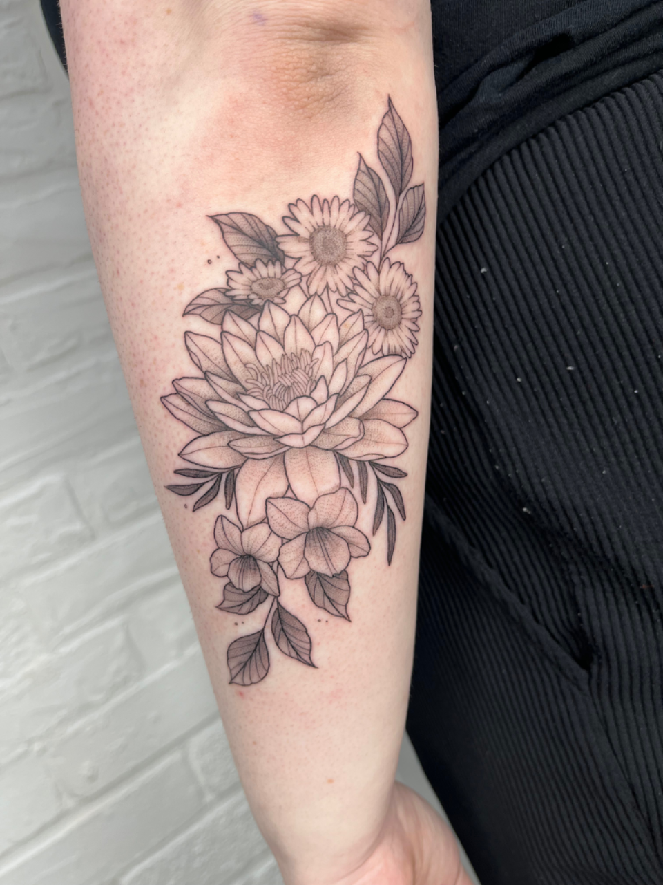 Elegant Fine Line Floral Tattoo • Tattoodo