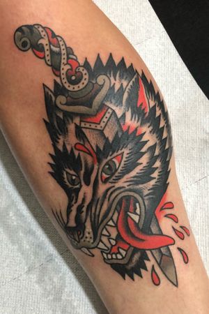 Tattoo uploaded by Kristofer Matthew • Wolf and dagger • Tattoodo