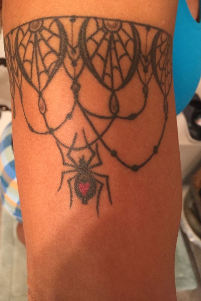 Tattoo uploaded by Neil • Black widow hanging on lace threading • Tattoodo