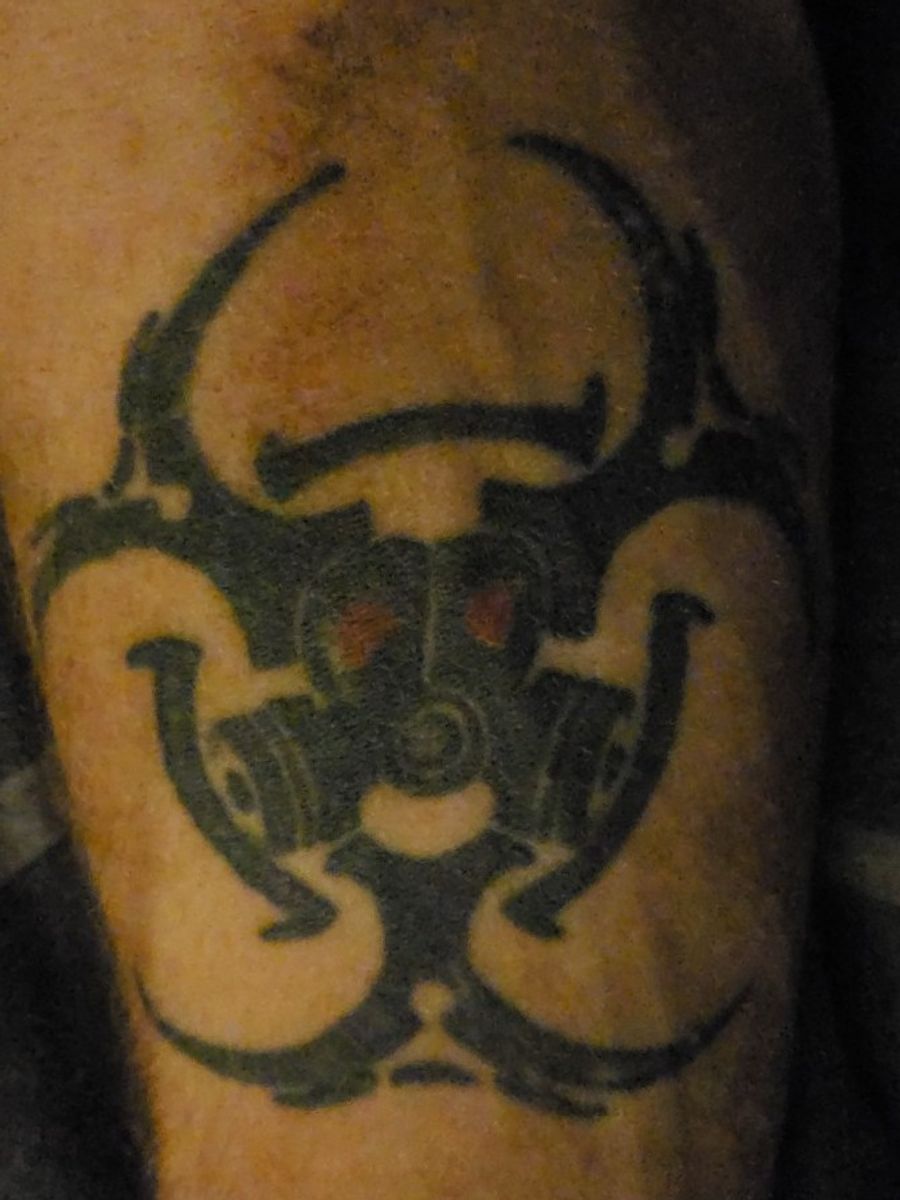 Tattoo uploaded by Cody Lewis • Bio-Hazard Symbol with Gas Mask • Tattoodo