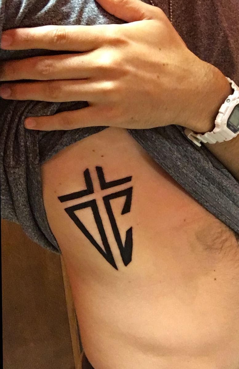 Tattoo uploaded by Tony Carpenetti • My initials "TDC" and a Cross in the negative space. • Tattoodo