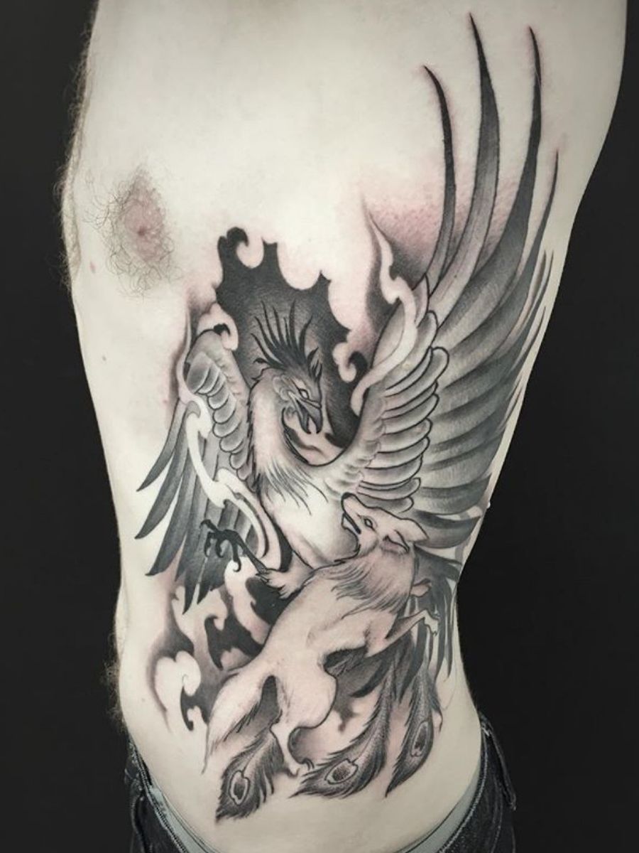 Tattoo uploaded by Steven • My 1st, Pheonix and Wolf on the Ribs. # ...