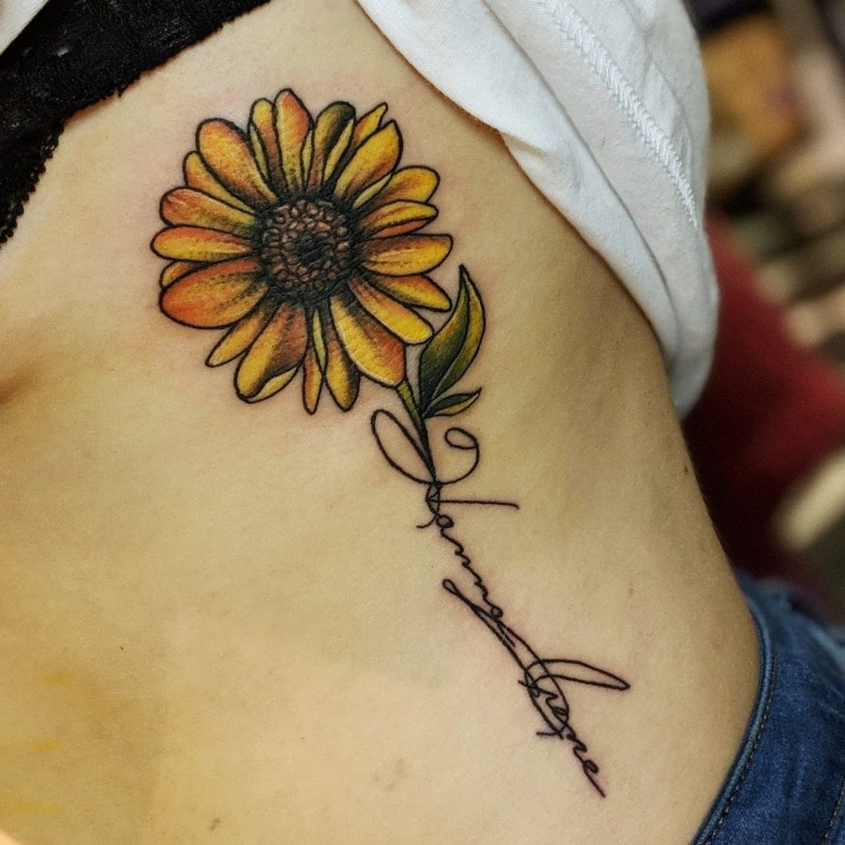 Tattoo uploaded by Tracy Marie • Sunflower Handwriting Rib Tattoo ...