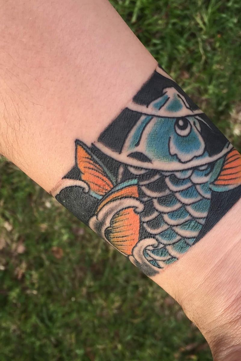 Tattoo uploaded by Adrian Sagastume • pt 1. Japanese koi fish wrist ...