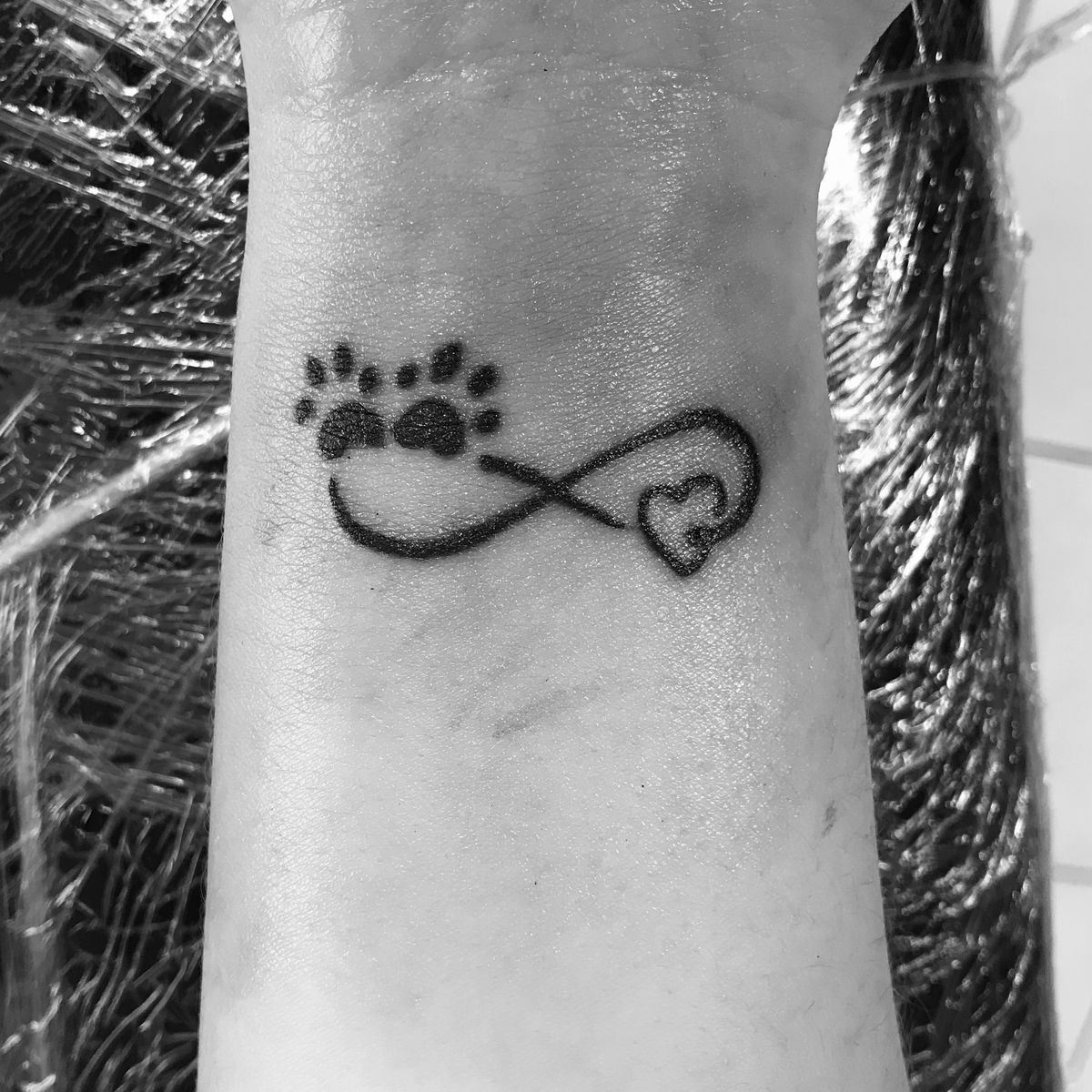 Tattoo uploaded by Lentel Devillé • Small tattoo, dog paws infinity ...