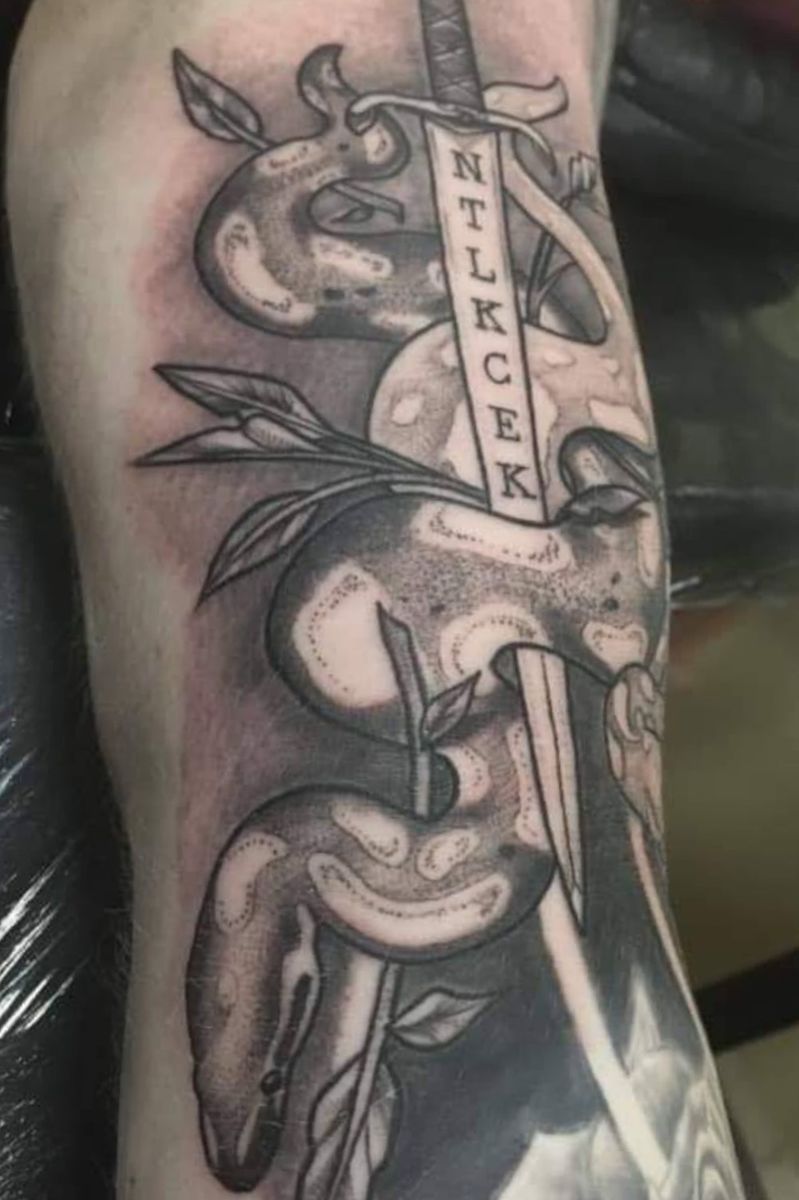 Tattoo uploaded by Darren Gilbert • Snakes around dagger. Inner bicep ...