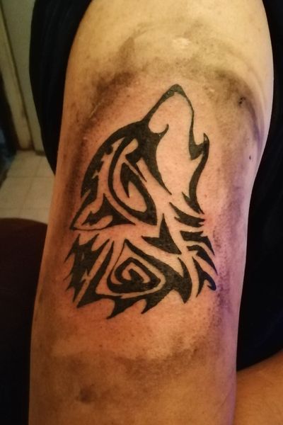 Alpha Wolf Symbol Tattoo