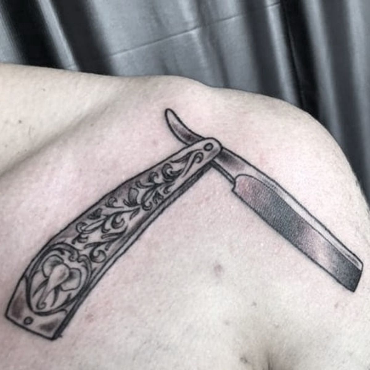 Tattoo uploaded by Rohan Bhate • An old cutthroat razor with a small ...