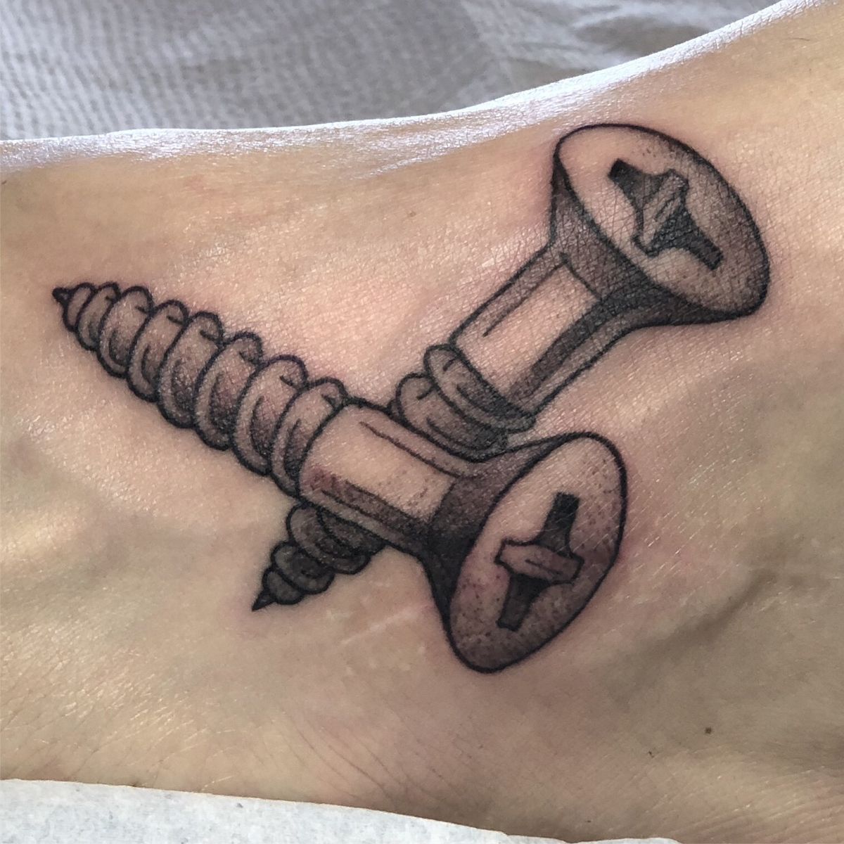 Tattoo uploaded by Christopher Vaughn Gay • Screws on one of my ...