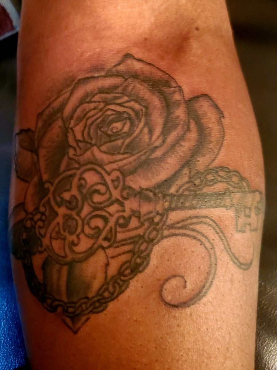 Tattoo uploaded by Brian Goodwin • Key with rose couple tattoo • Tattoodo