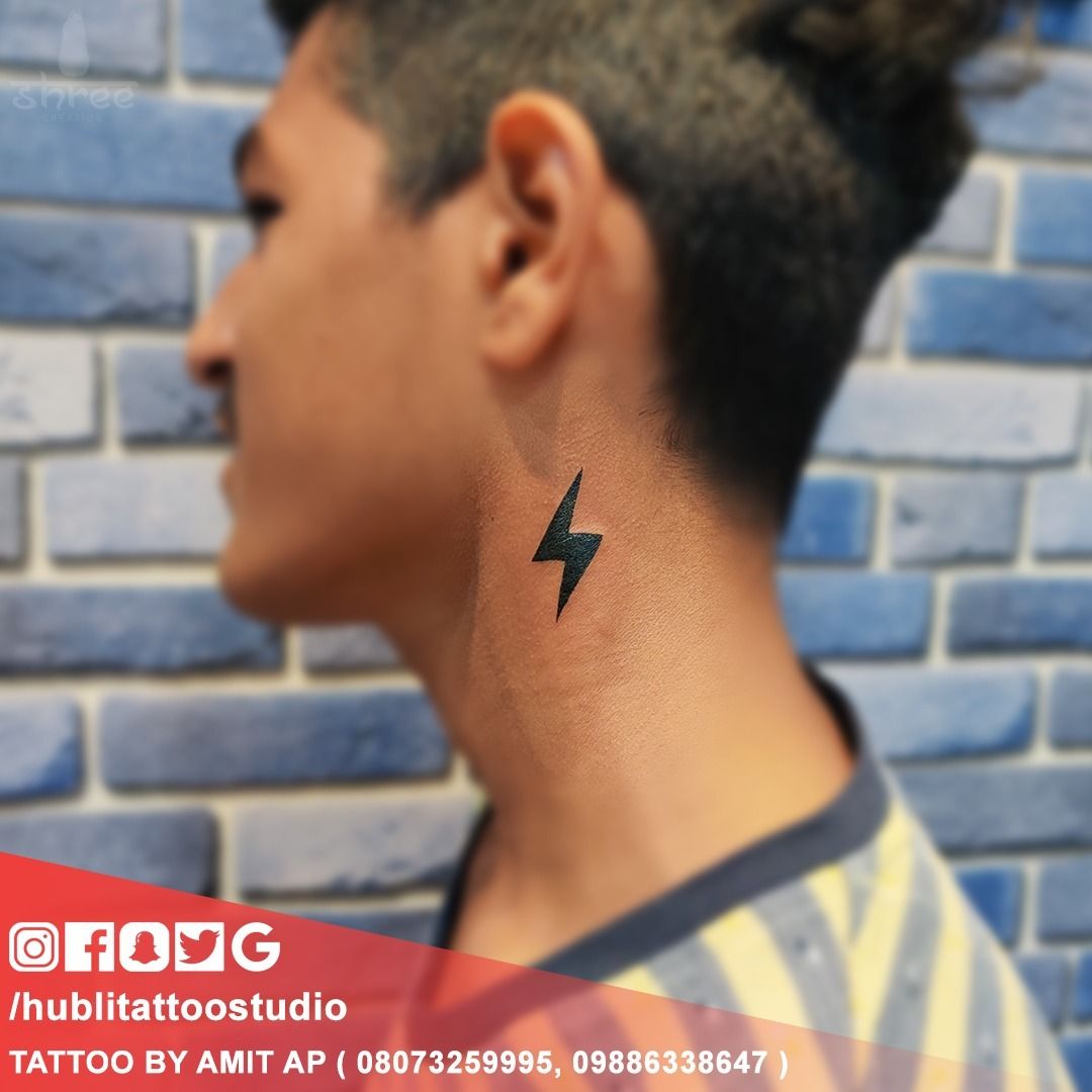 Lightning bolt tattoo behind ear - Bronctattooaus.com