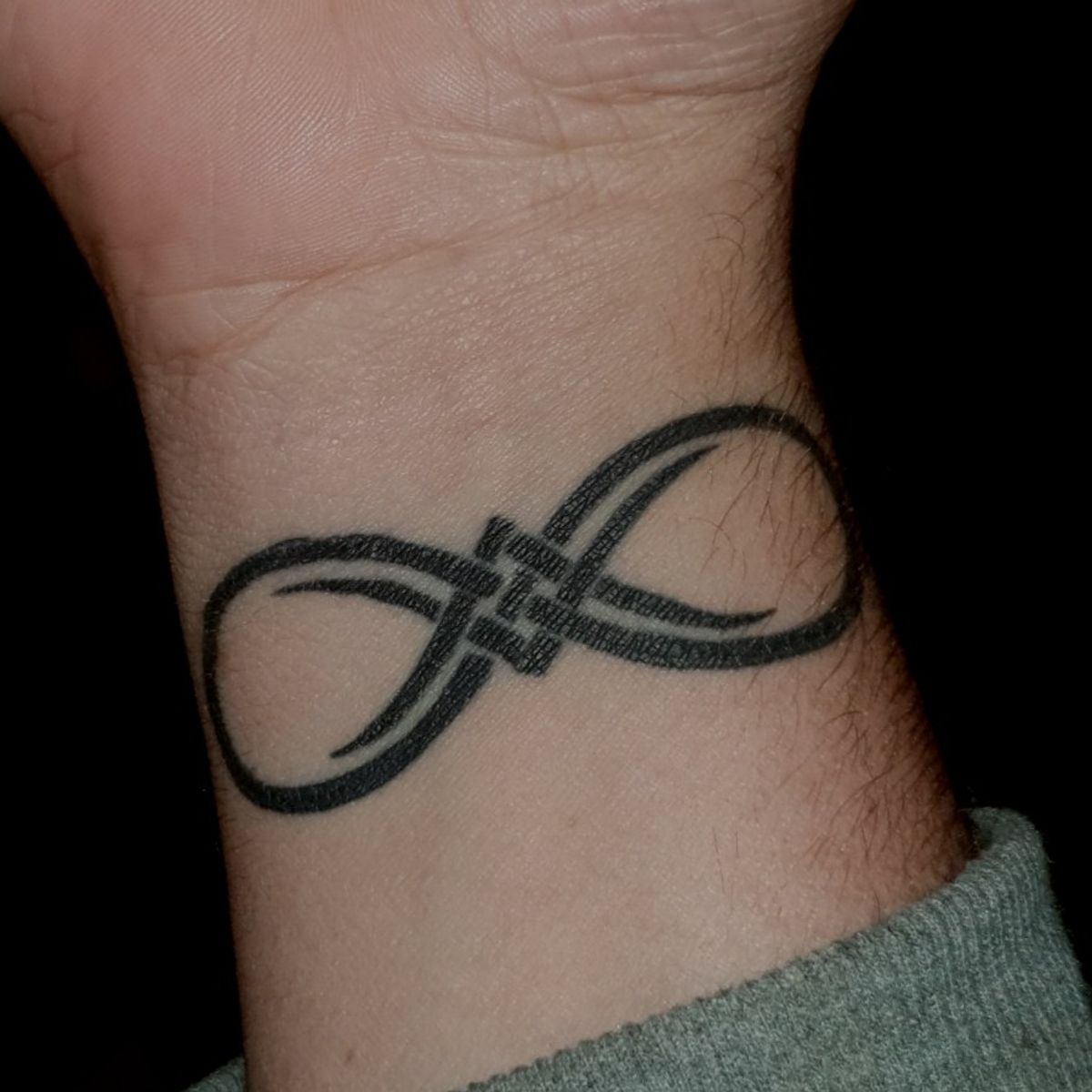 Tattoo uploaded by Kaleb Blackmore • Tribal Infinity Tattoo • Tattoodo