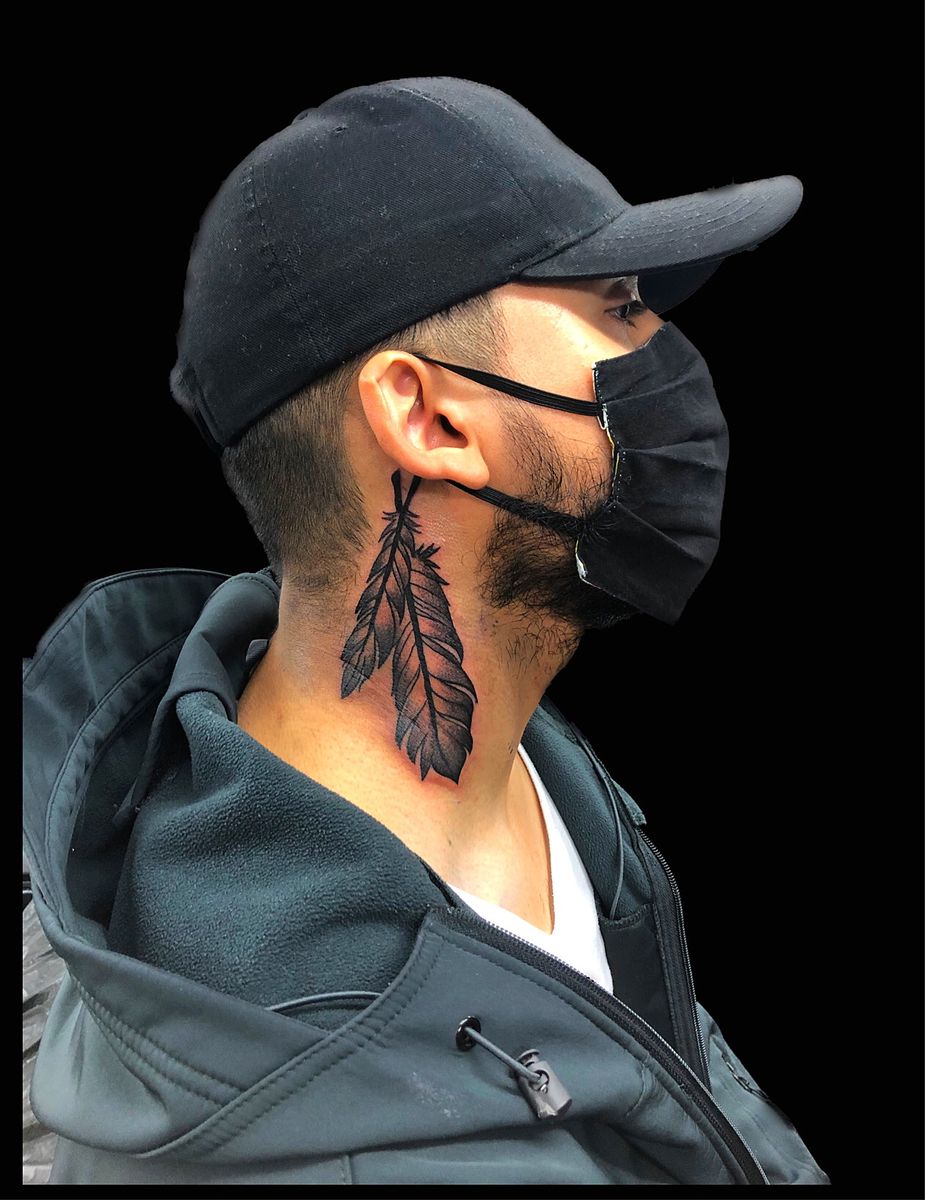 Tattoo uploaded by Camden piercing and tattoo studio • Feathers neck ...