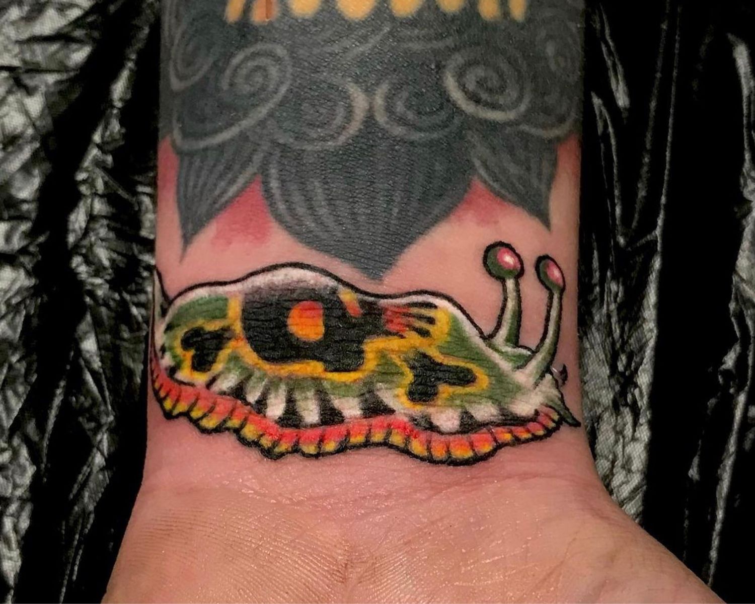 Tattoo uploaded by Cult Classic Tattoo • Slug wrist filler by Ant ...