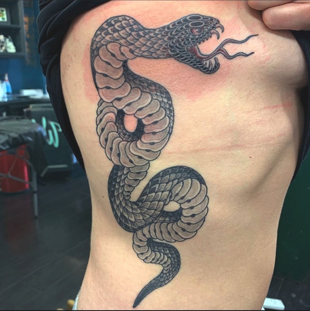 London Japanese Snake Rib Tattoo • Tattoodo