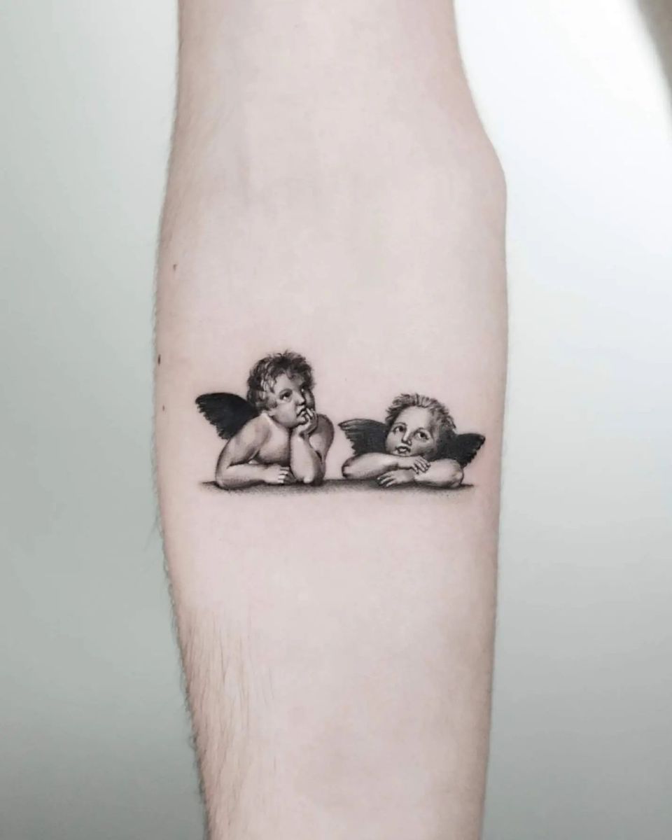 Tattoo uploaded by A Touch Of Ink • Tatuaj alb-negru cu îngeri A Touch ...