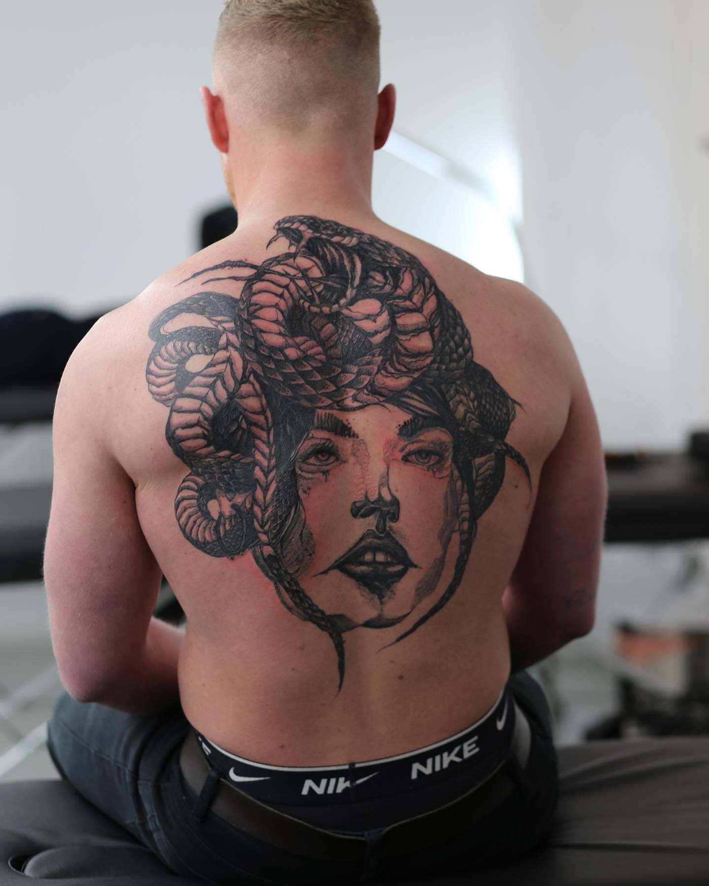 Elegant Blackwork Snake and Woman • Tattoodo