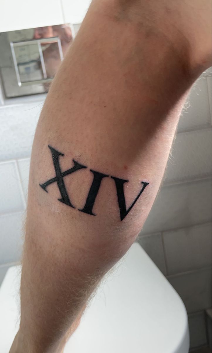 Tattoo uploaded by Adam Crowhurst • XIV 14 Roman Numerals • Tattoodo