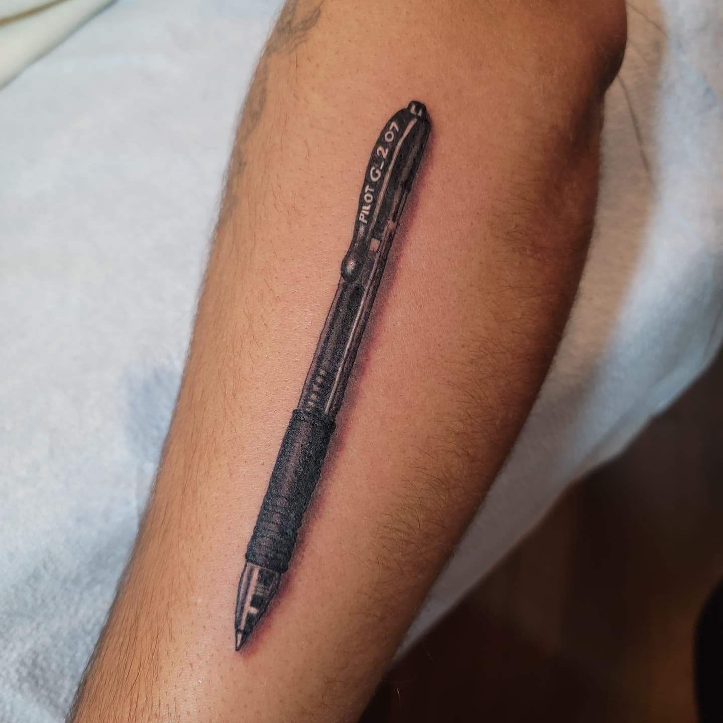 Realistic Pen Tattoo on Forearm • Tattoodo