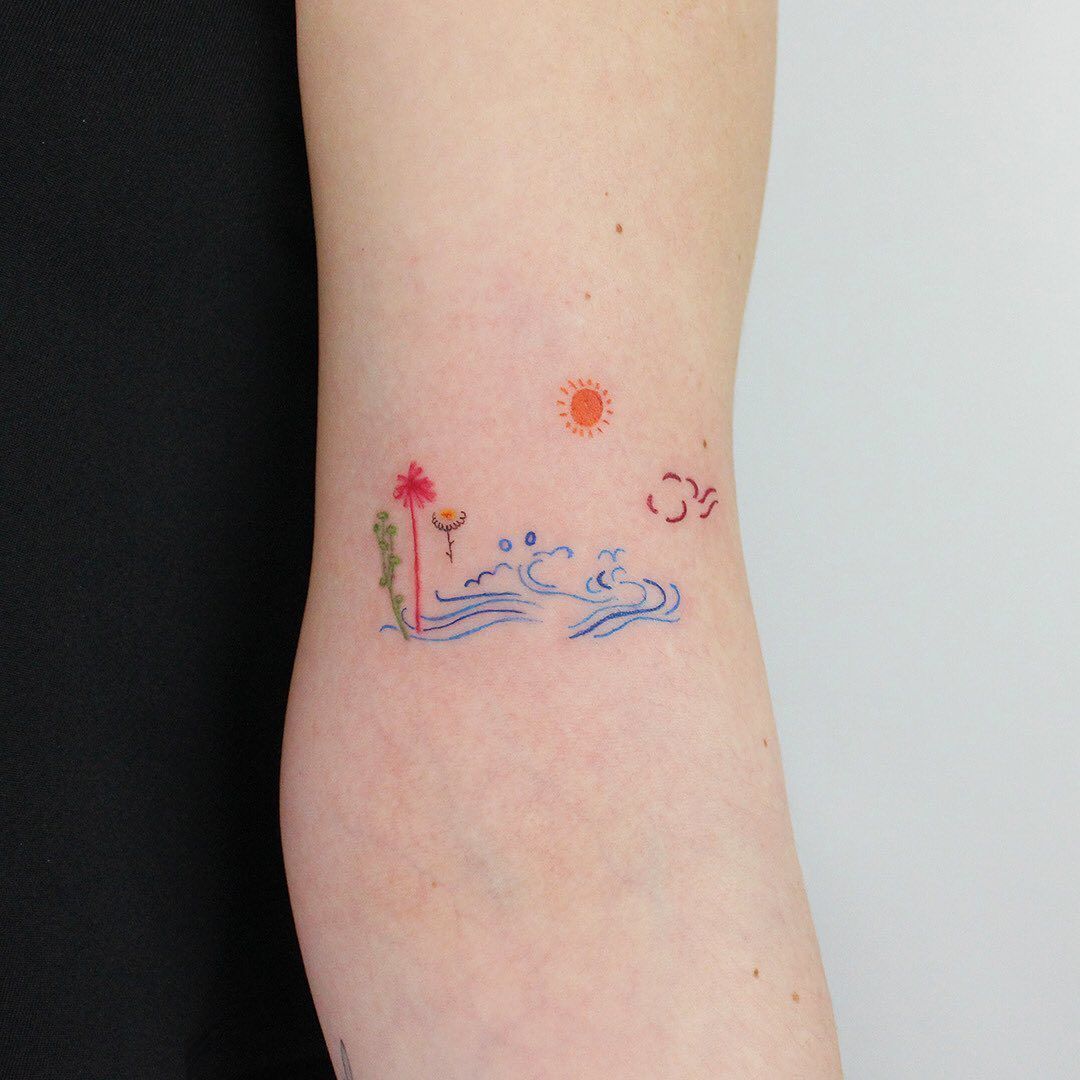 Fine Line Wave and Sun Upper Arm Tattoo • Tattoodo