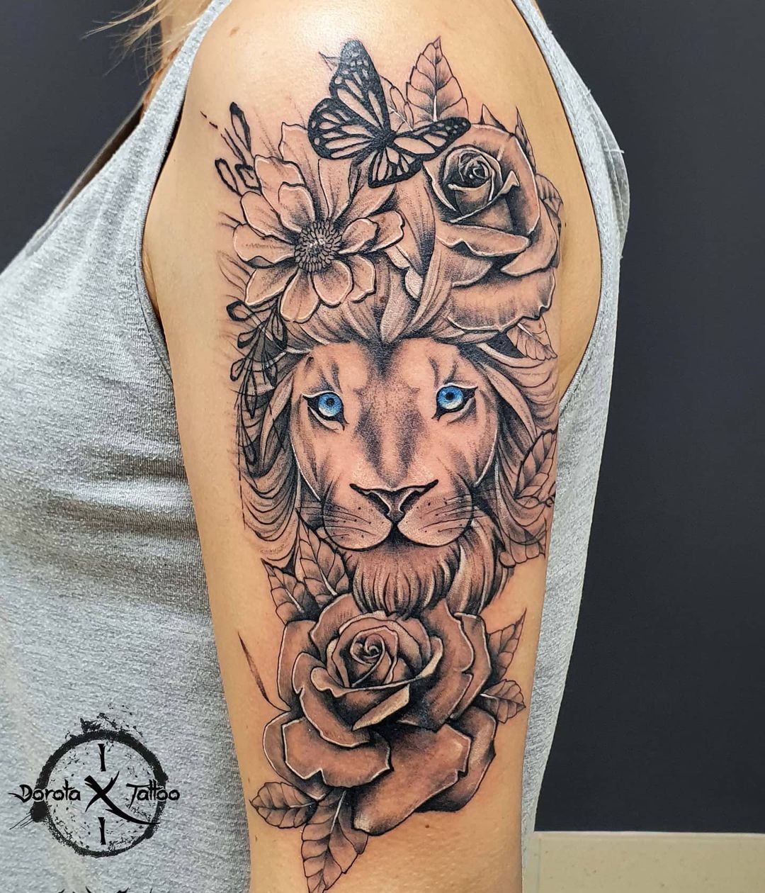 Lion & Butterfly Upper Arm Tattoo • Tattoodo