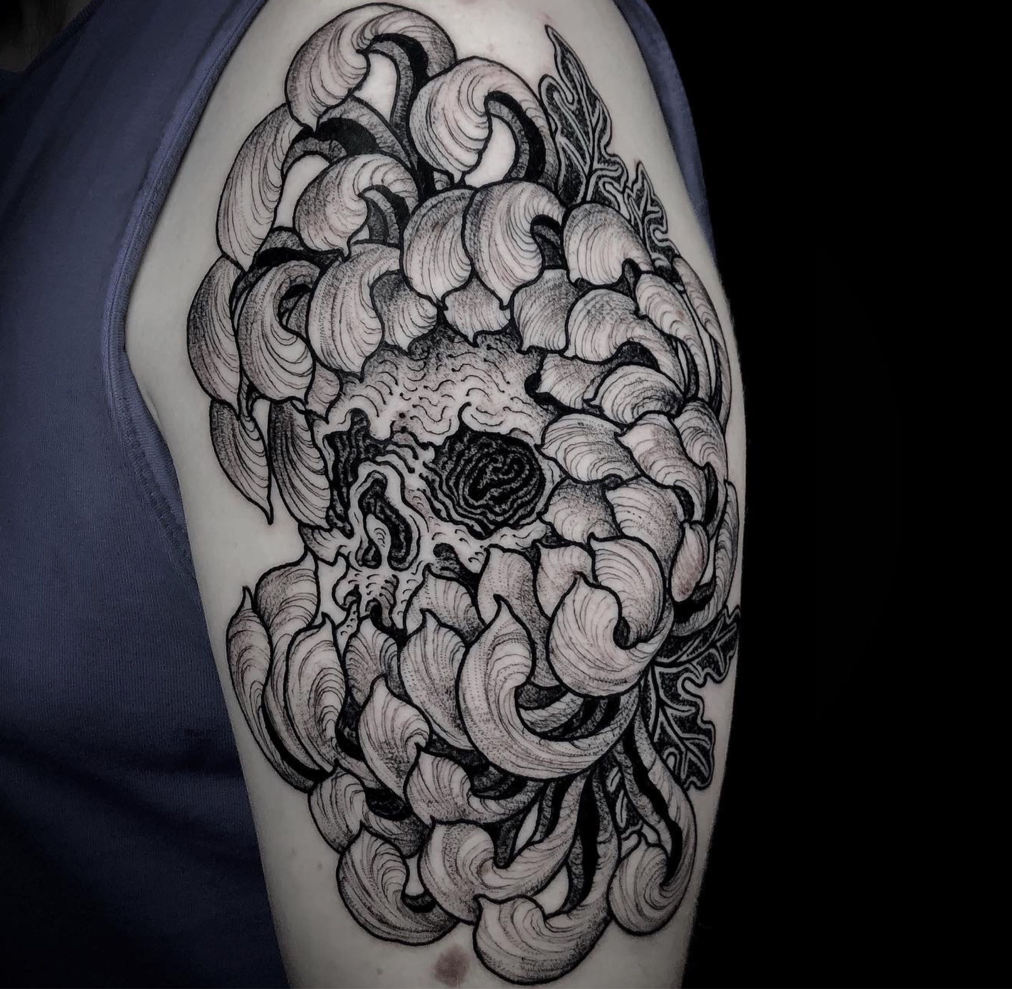 Chrysanthemum Skull Upper Arm Tattoo • Tattoodo