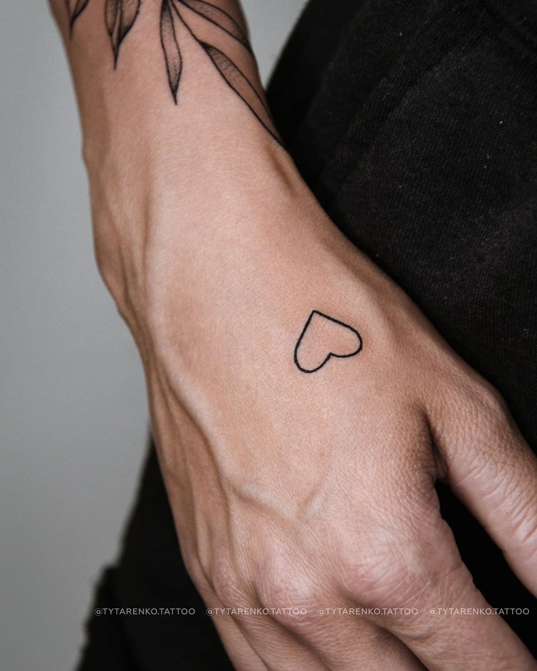 Heart Fine Line Hand Tattoo by Kateryna Tytarenko • Tattoodo