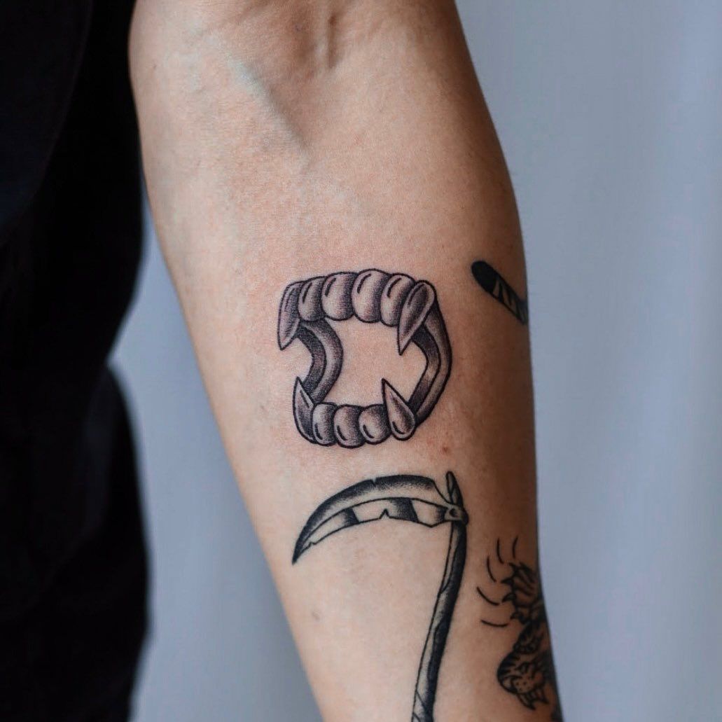 Vampire Teeth Tattoo Designs