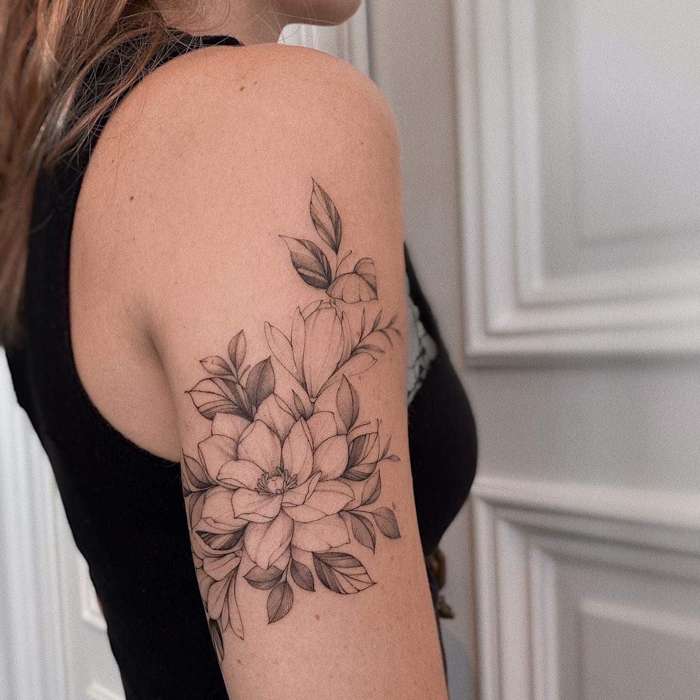 Elegant Fine Line Flower Tattoo • Tattoodo