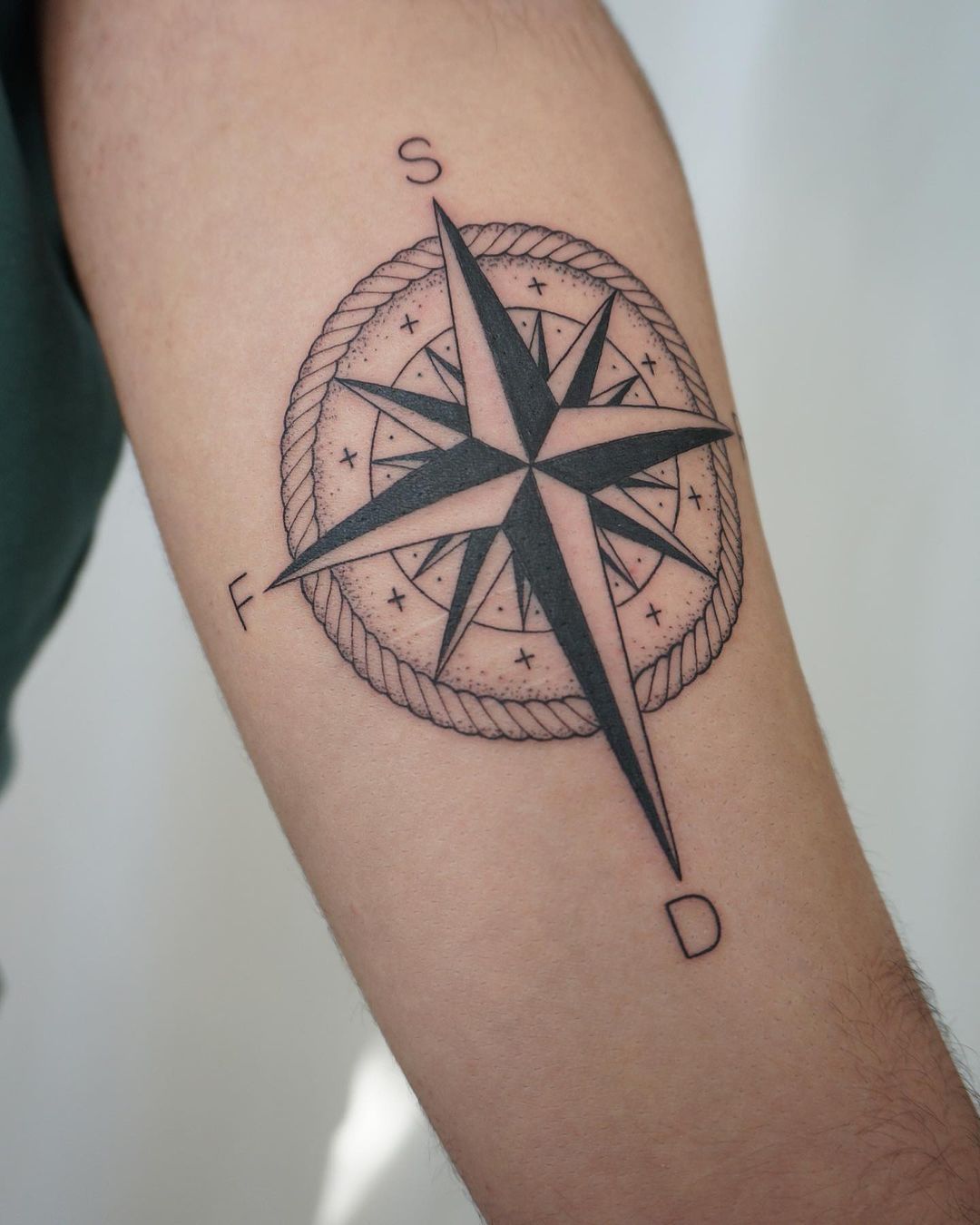 Fine Line Compass and Rope Tattoo • Tattoodo