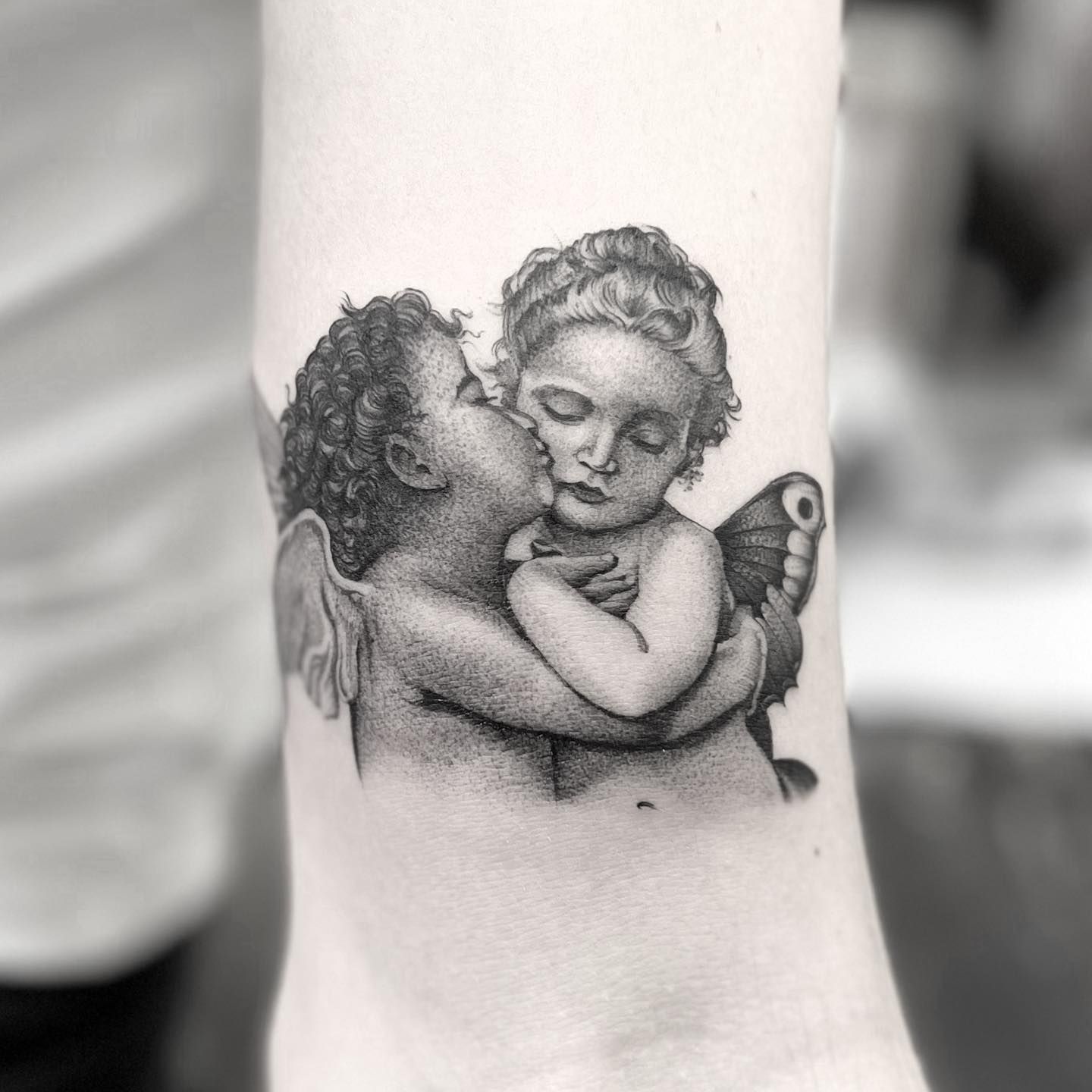 Angel & Cupid Arm Tattoo • Tattoodo