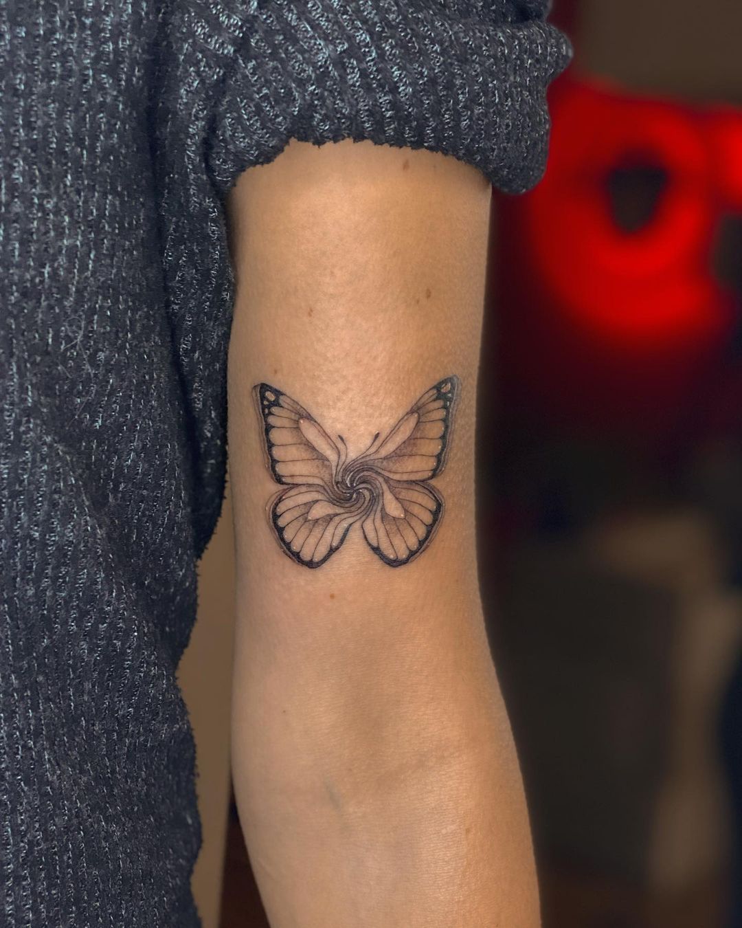 Illustrative Butterfly & Pattern Upper Arm Tattoo • Tattoodo