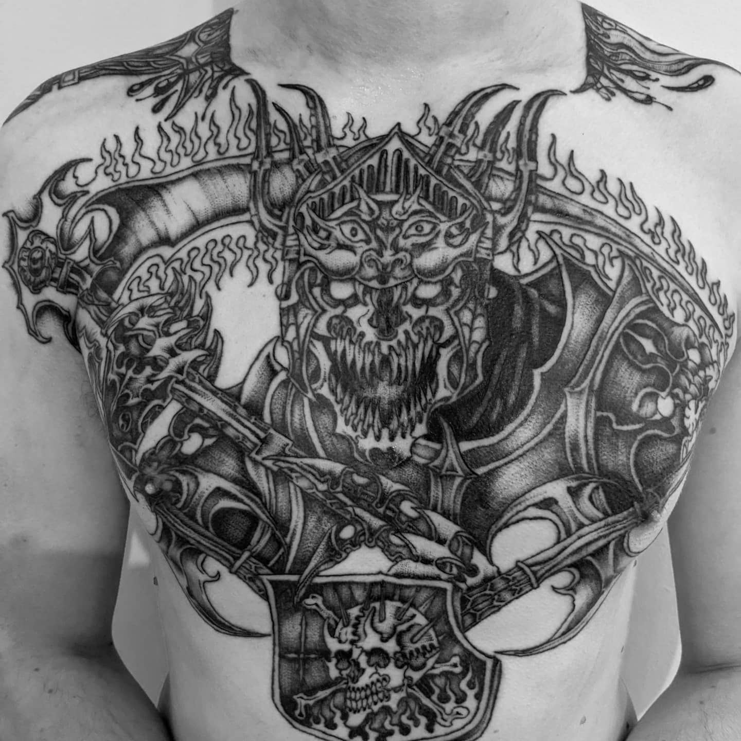 Skull and Axe Chest Piece • Tattoodo