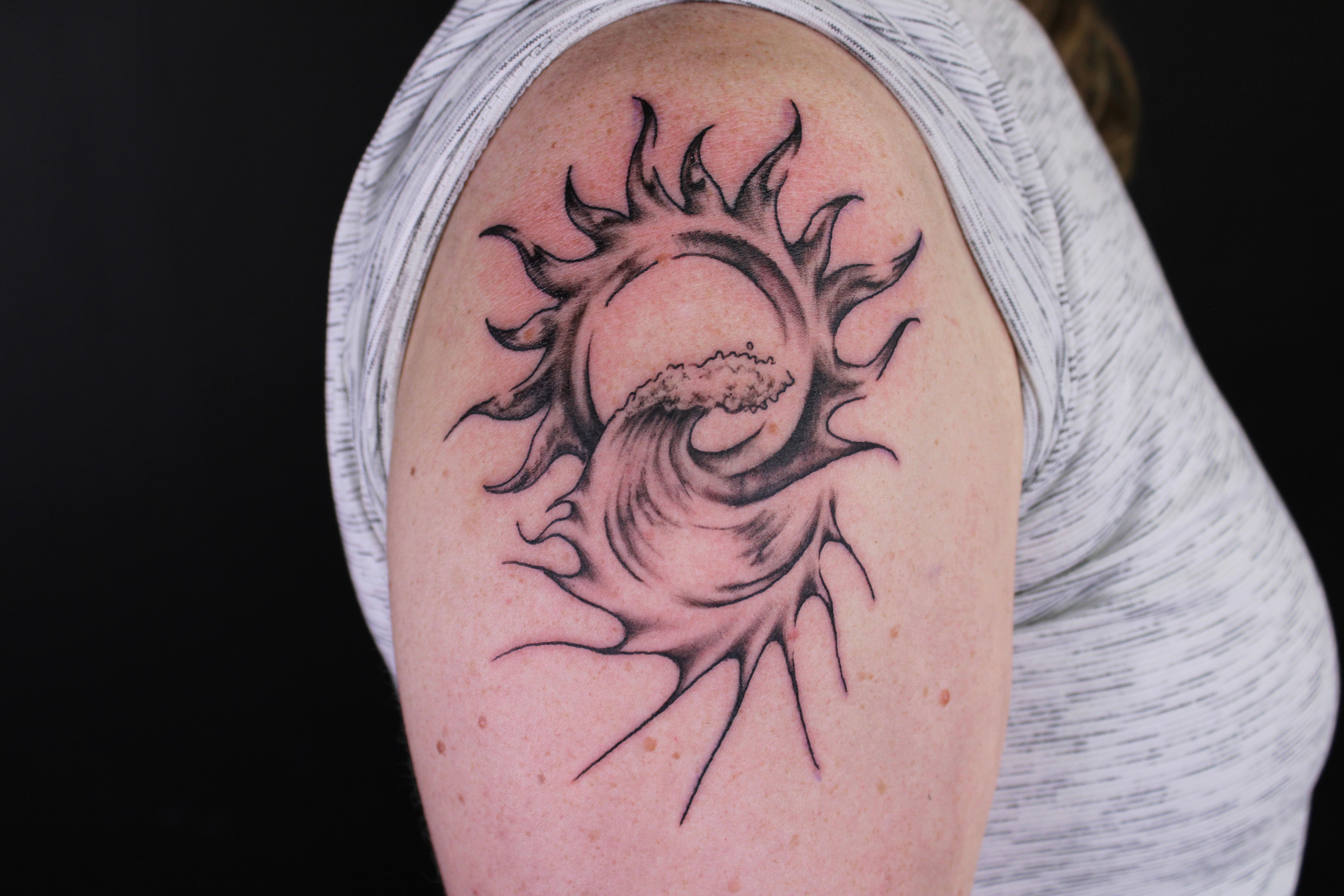 Sun Shoulder Tattoo