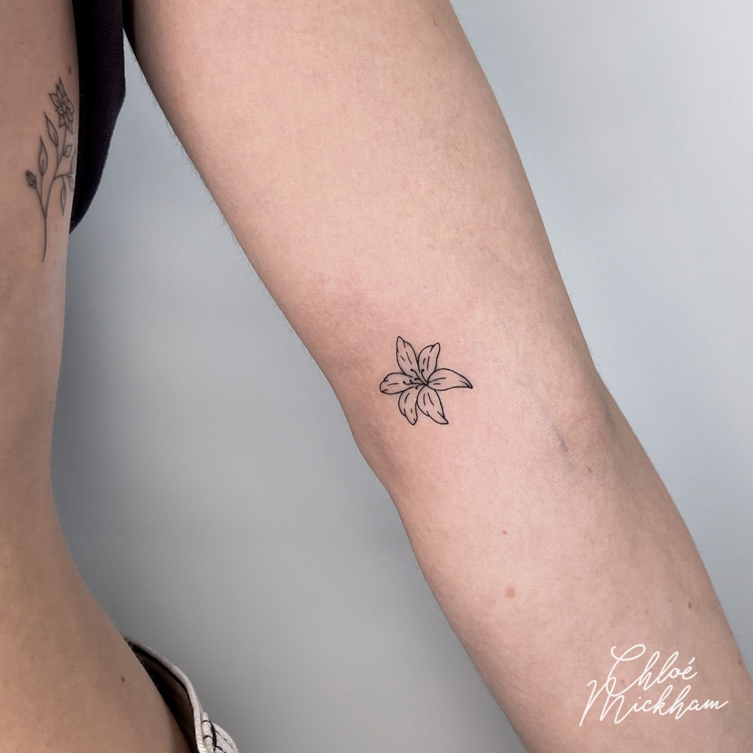 Fine Line Lily Tattoos - Minimal Flower Art • Tattoodo