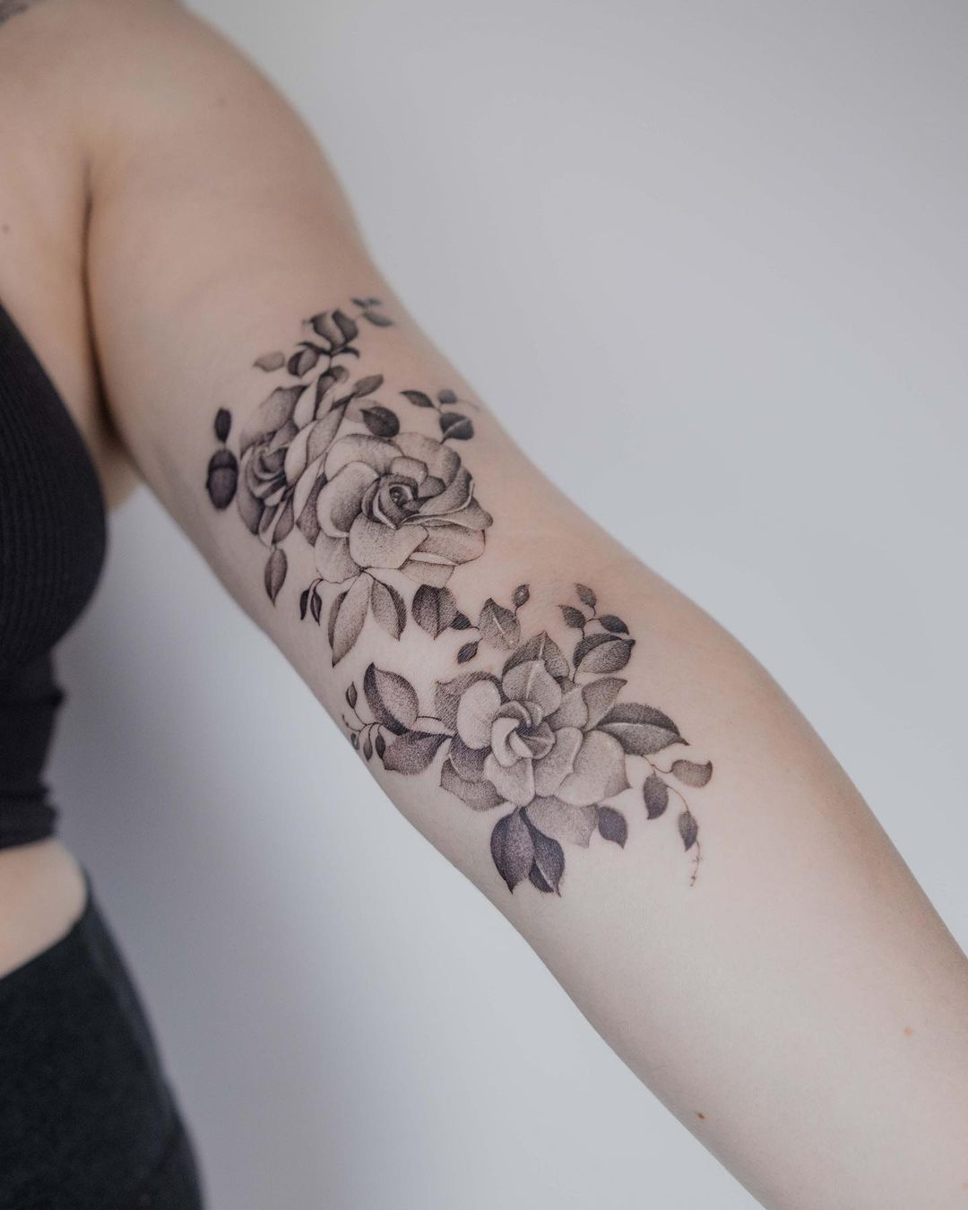 Fine Line Dotwork Floral Upper Arm Tattoo • Tattoodo