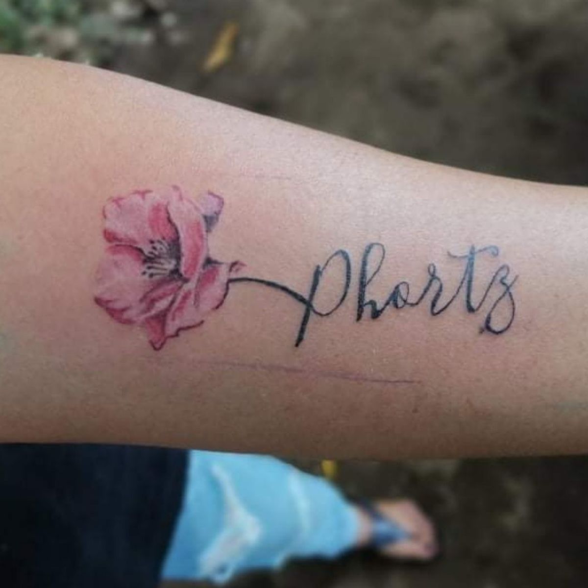 Tattoo uploaded by Tattooist_Jet • Flower and name tattoo • Tattoodo