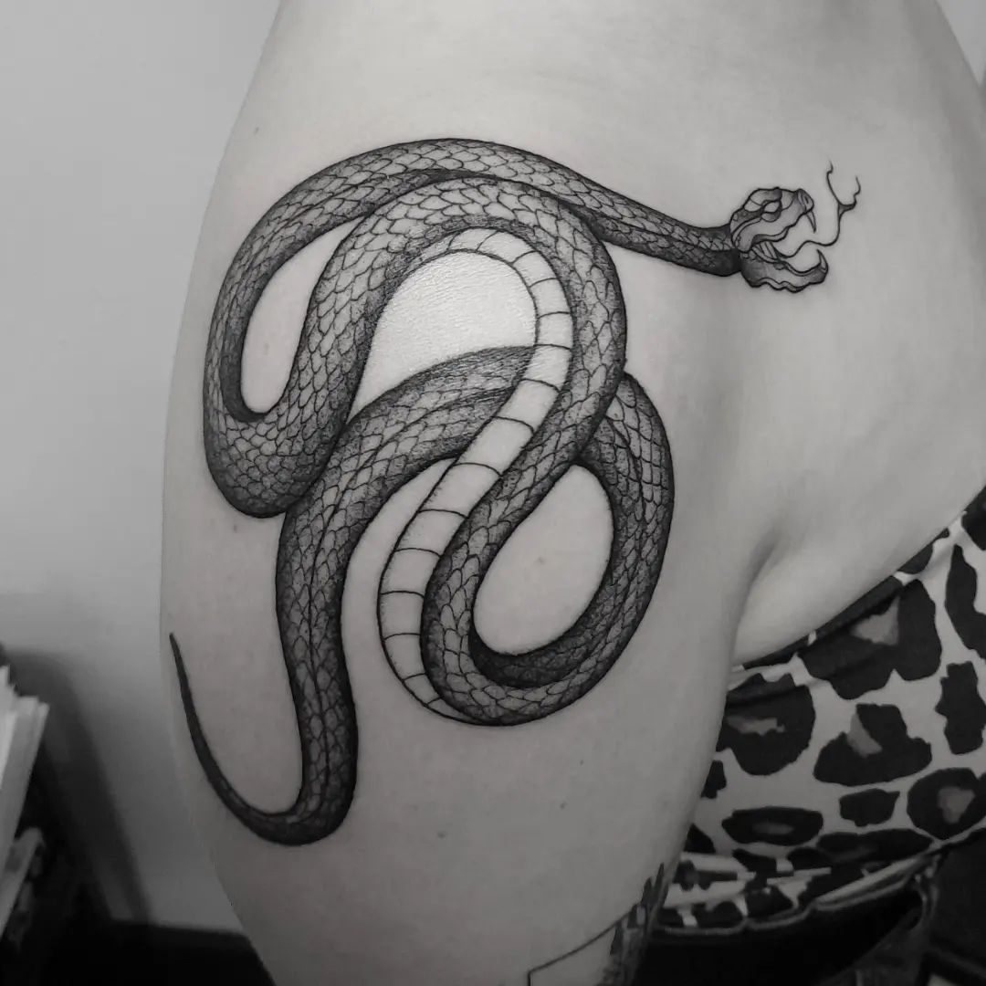 Serpentine Elegance • Tattoodo