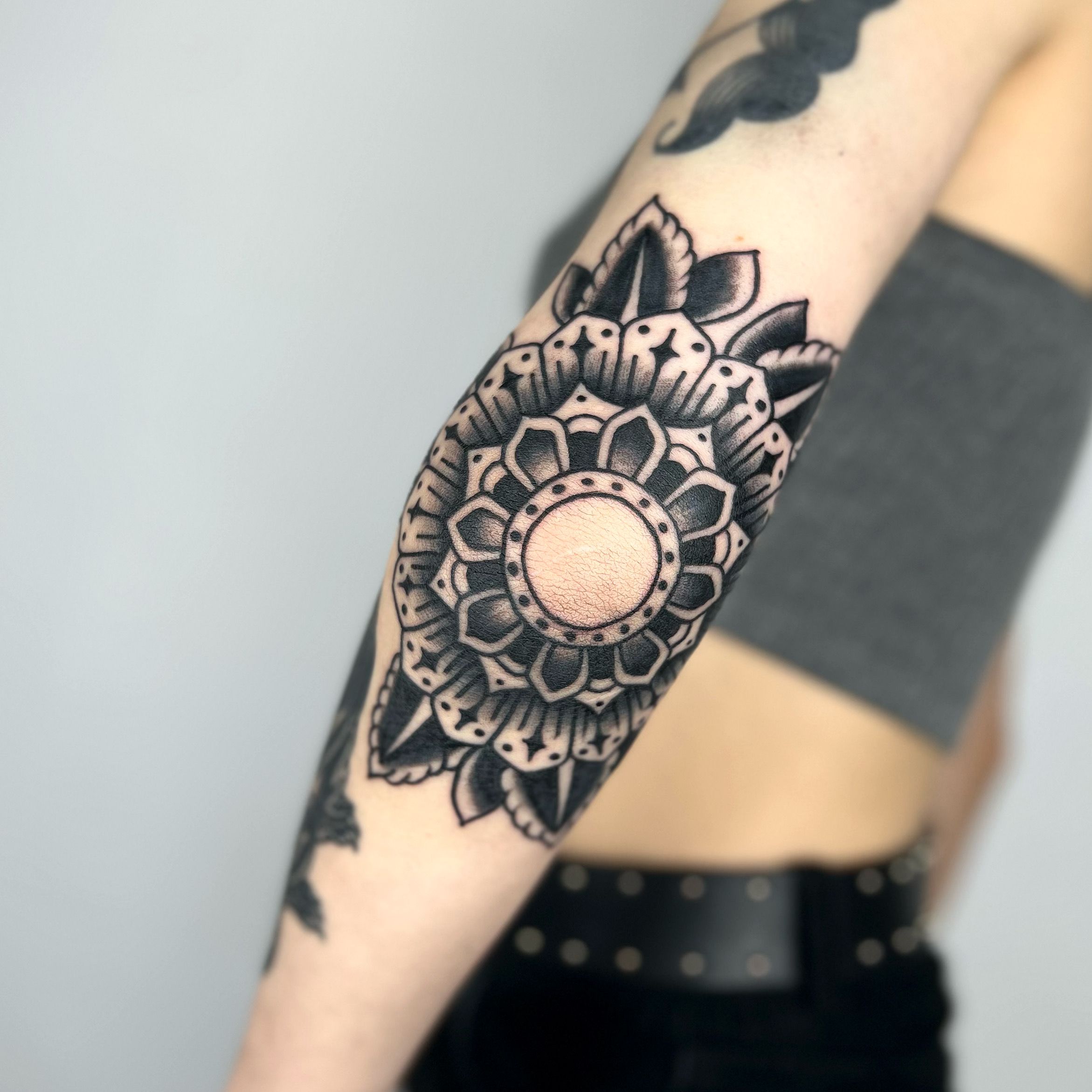 Ornamental Mandala and Leaf Elbow Tattoo • Tattoodo