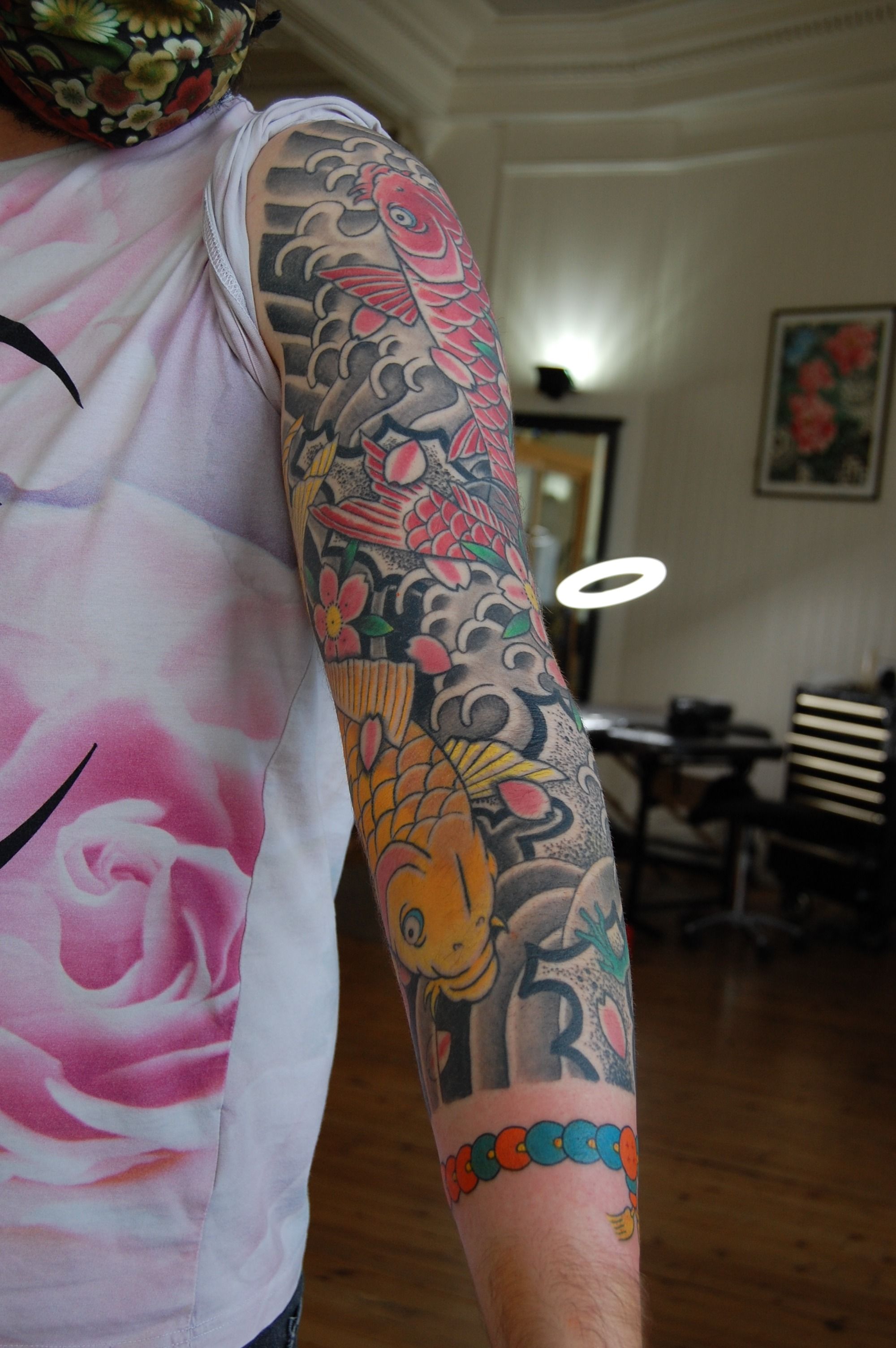 Japanese Fish and Waves Sleeve Tattoo • Tattoodo