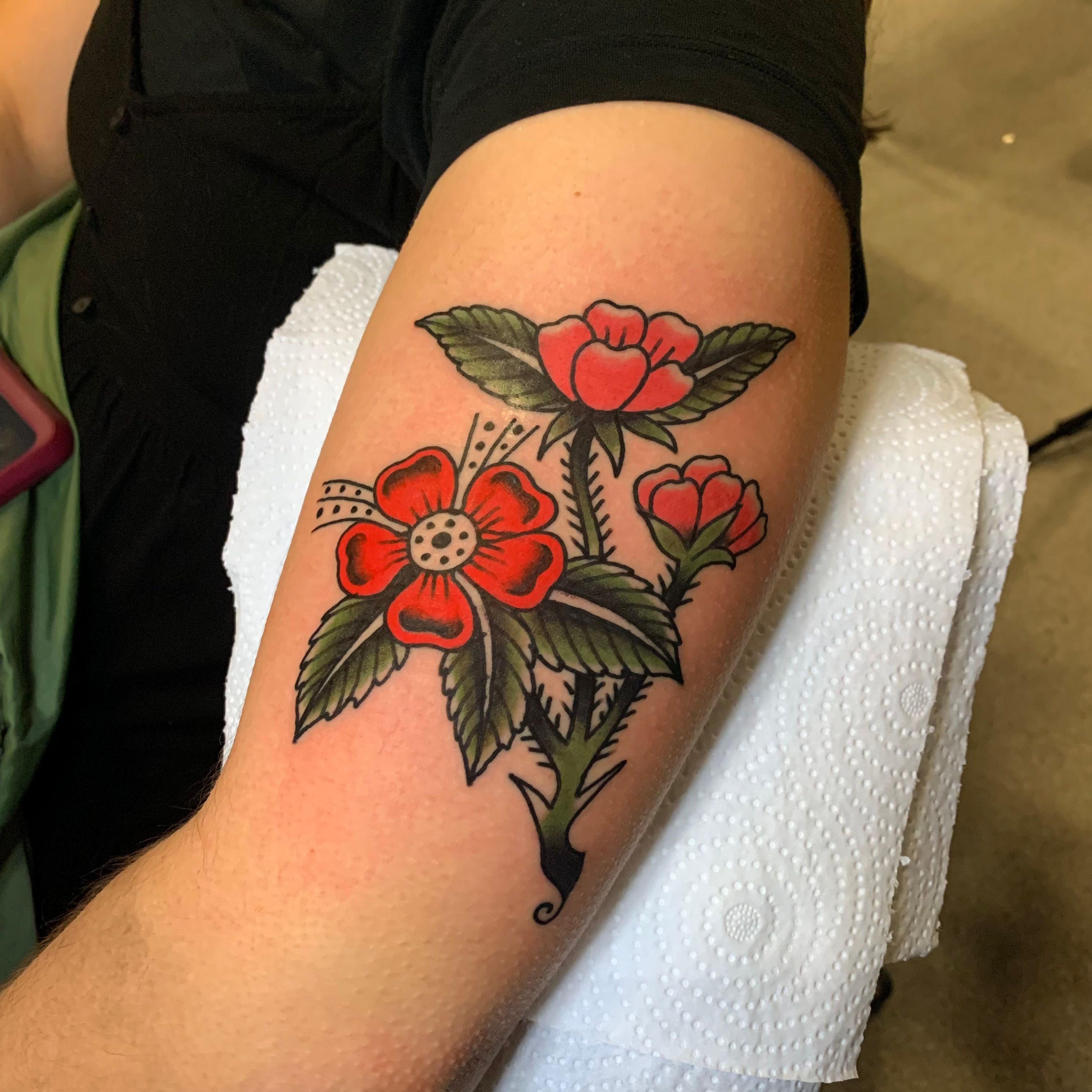 Traditional Flower Upper Arm Tattoo by Andrea Furci • Tattoodo