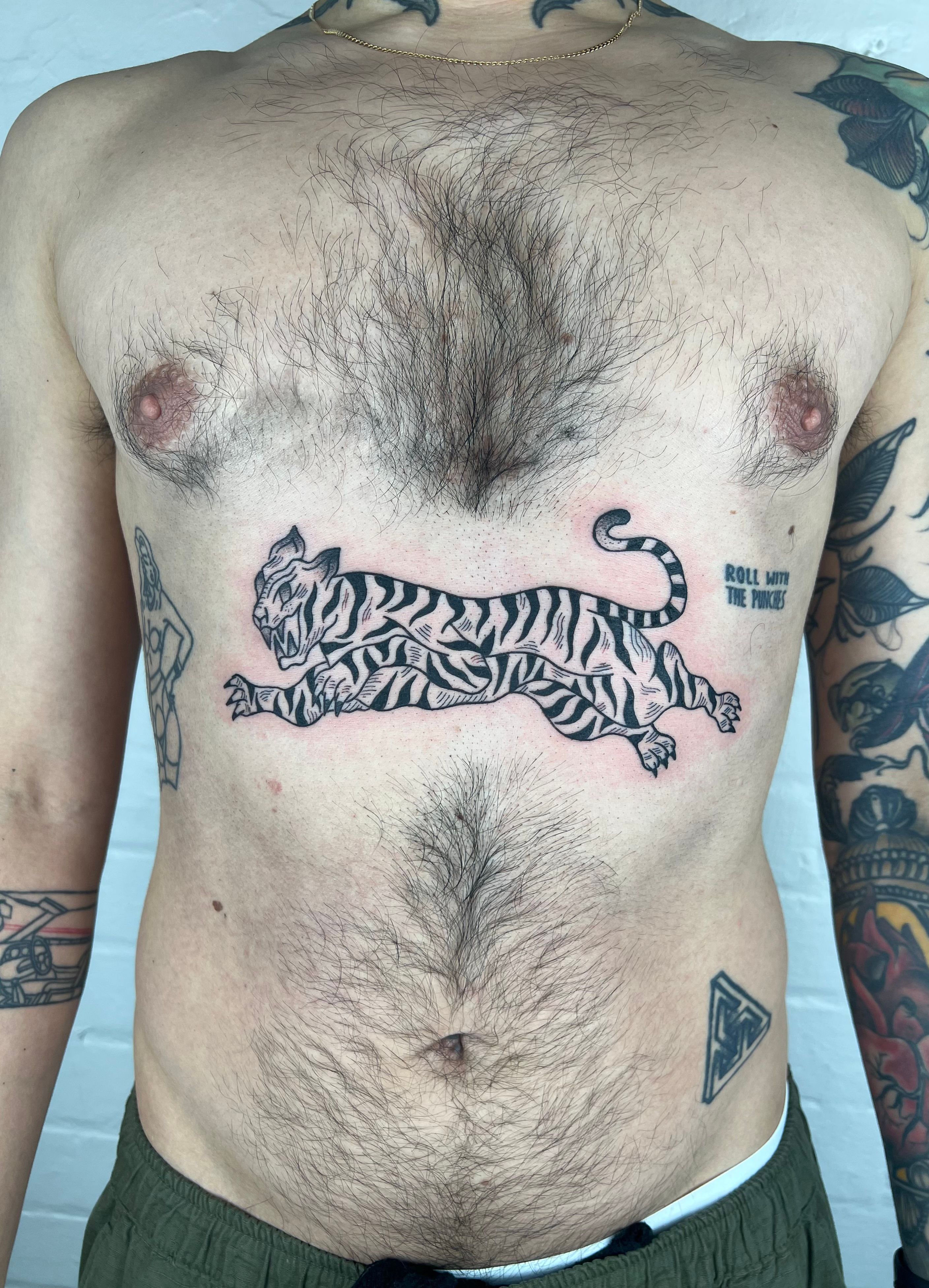 Striking Tiger Belly Tattoo • Tattoodo