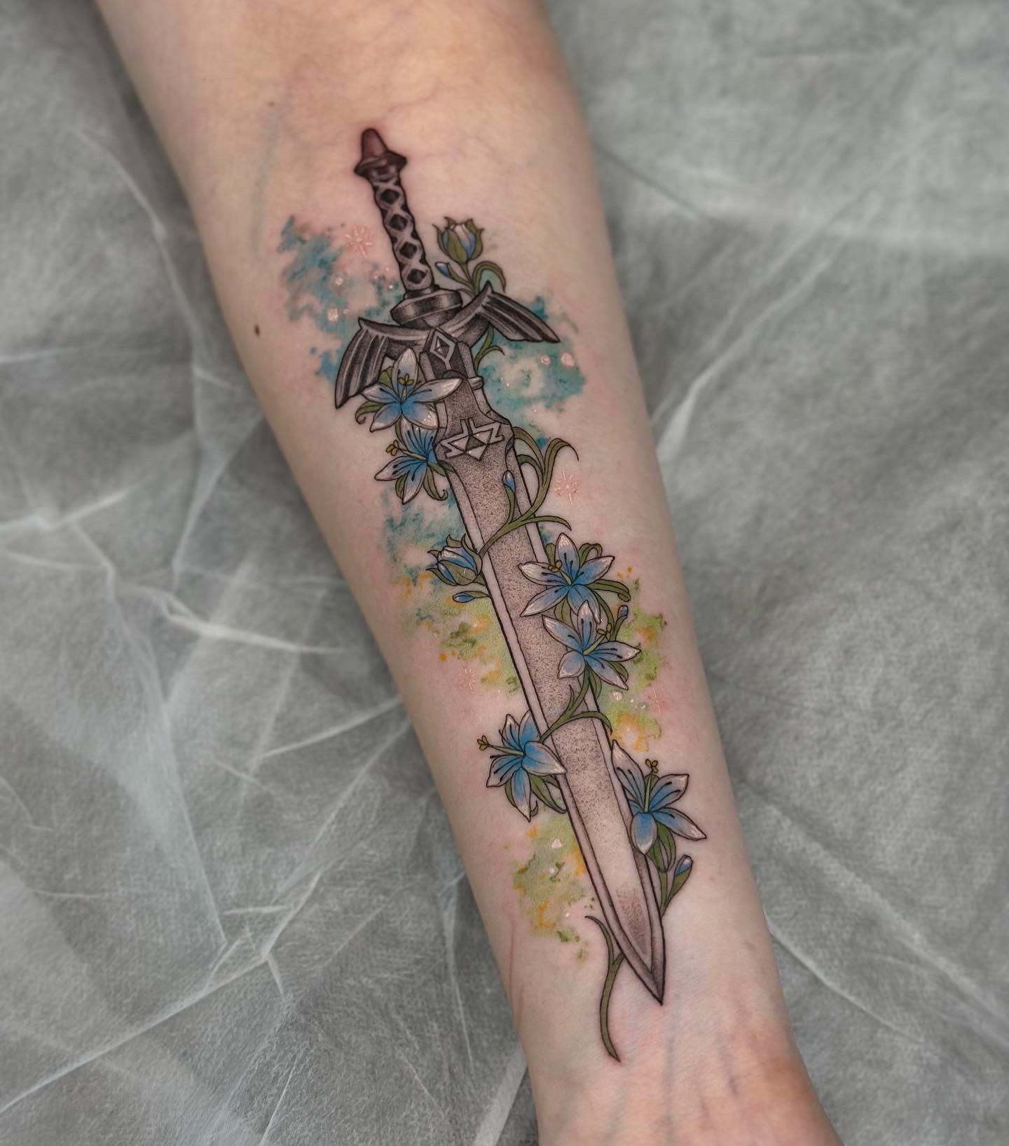 Sword with flowers • Tattoodo
