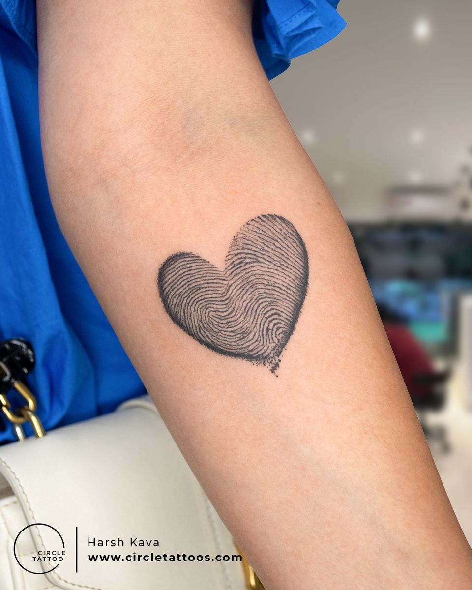 Tattoo uploaded by Circle Tattoo • Heart Shape Finger Print Tattoo made ...