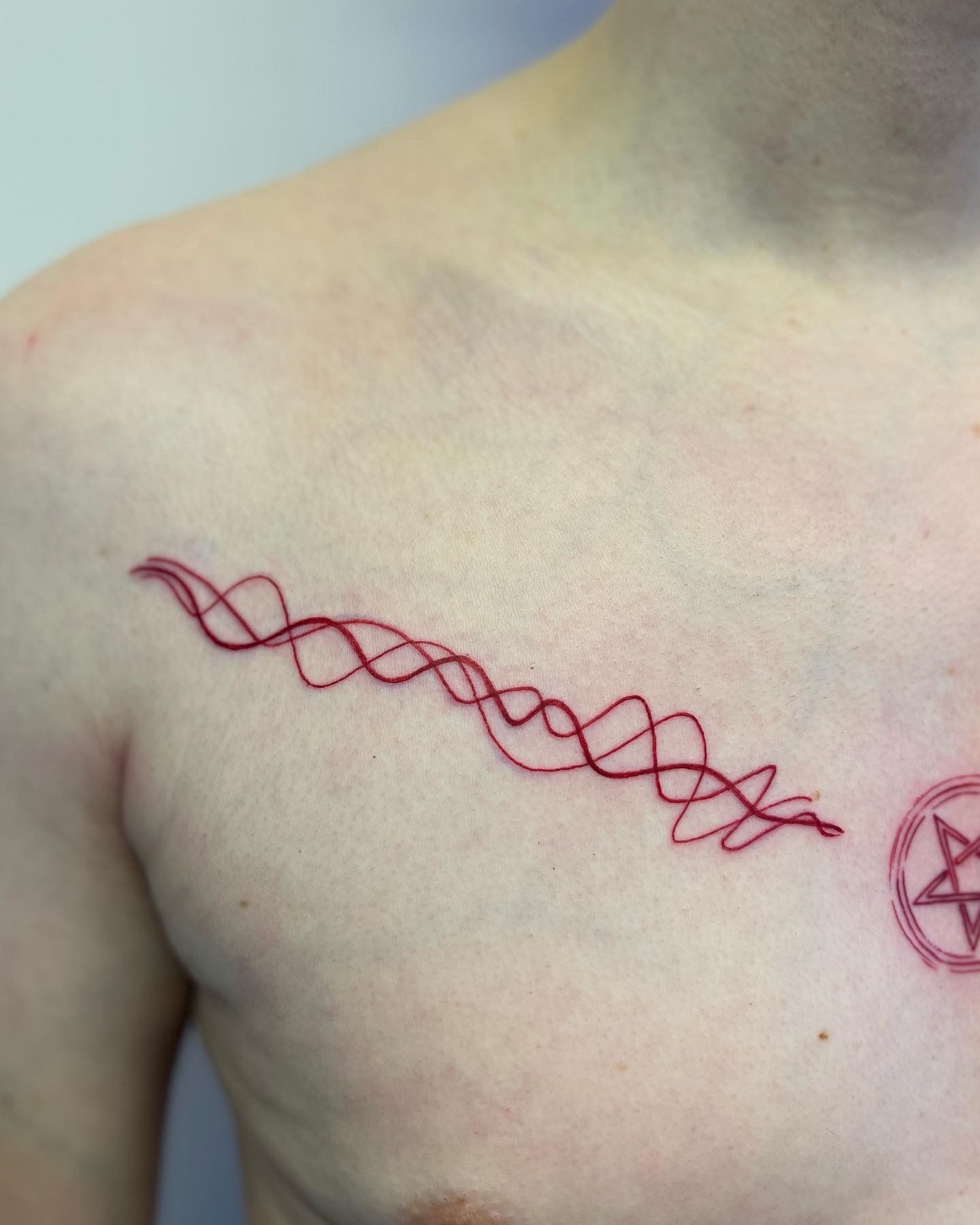 Fluid Red Lines Tattoo • Tattoodo