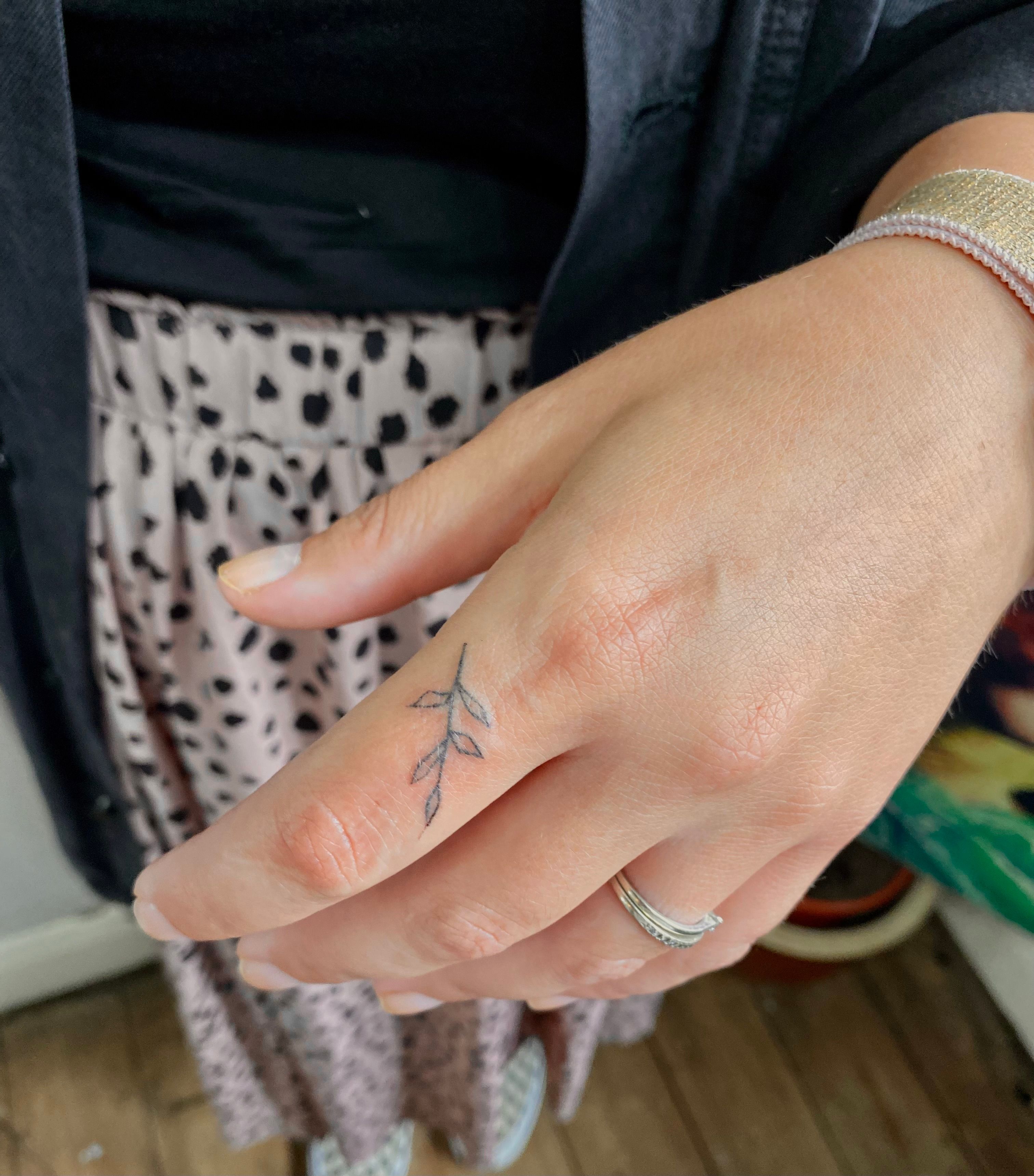 Ignorant Flower Twig Finger Tattoo • Tattoodo