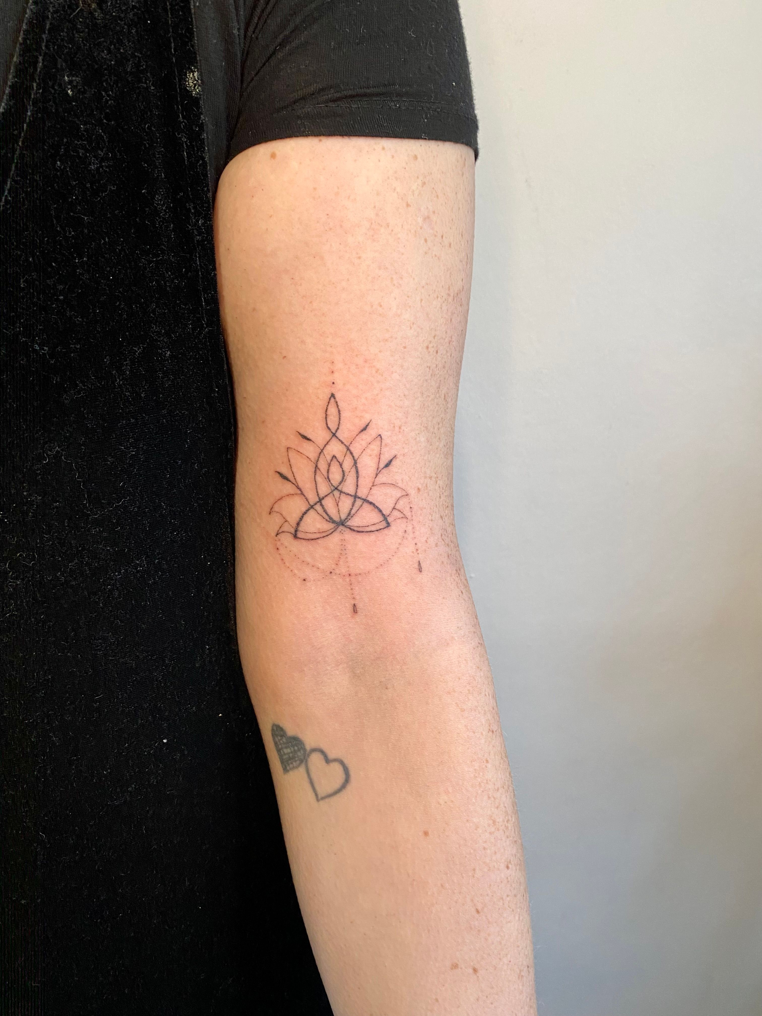 Celtic Lotus Flower Tattoos